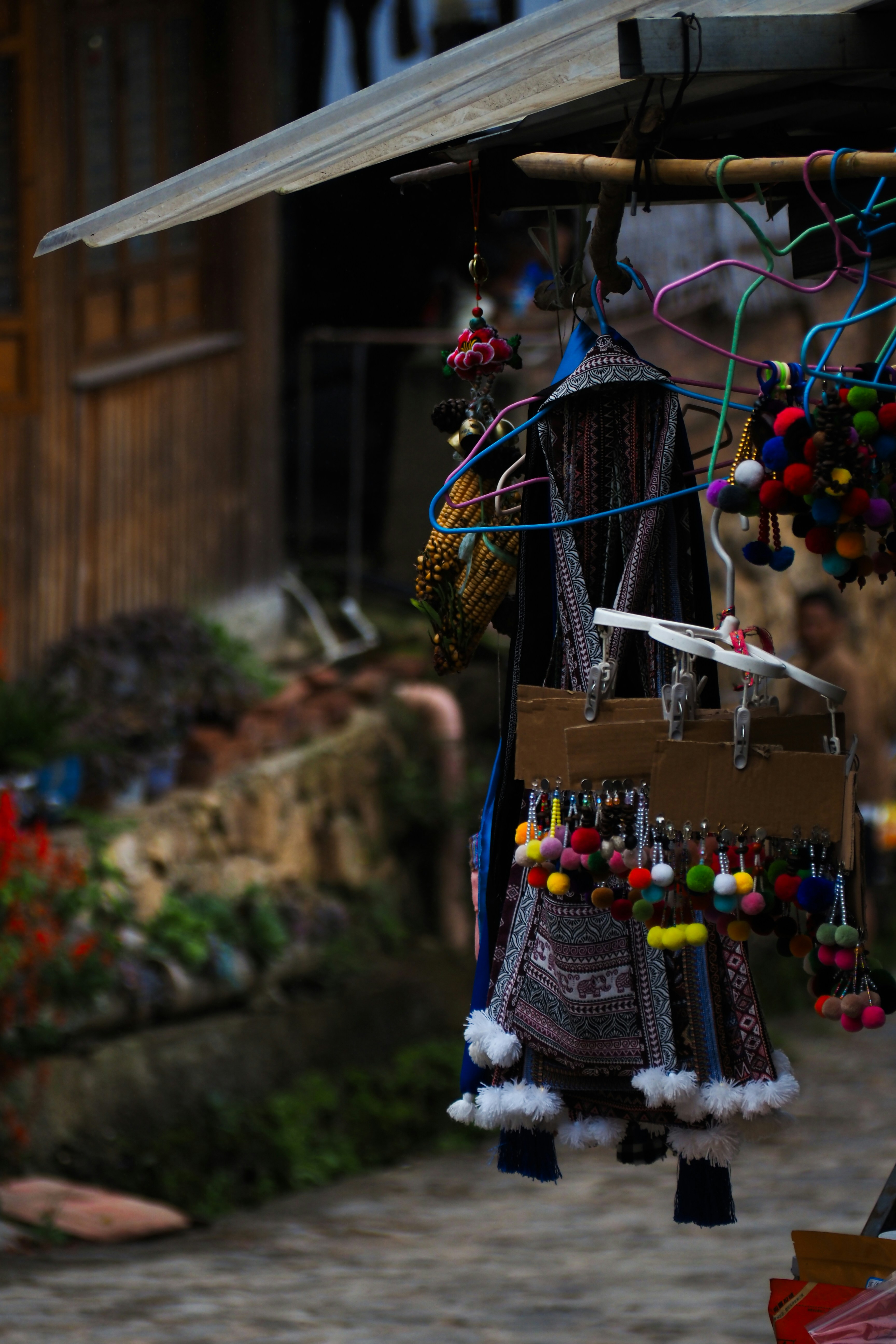 Colorful Trinkets on a Quiet Market Path