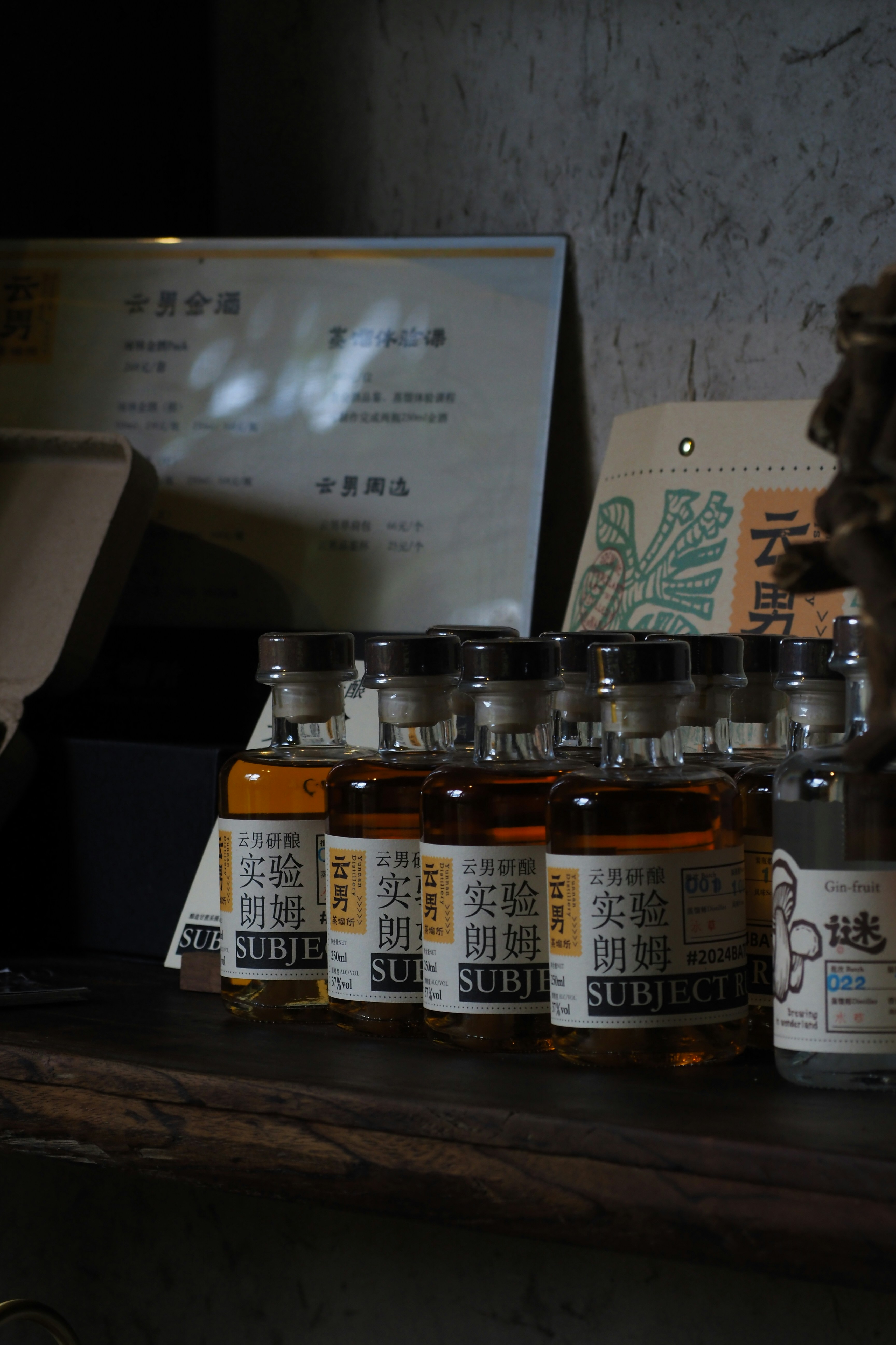 Amber Bottles in a Dim Bar Shelf