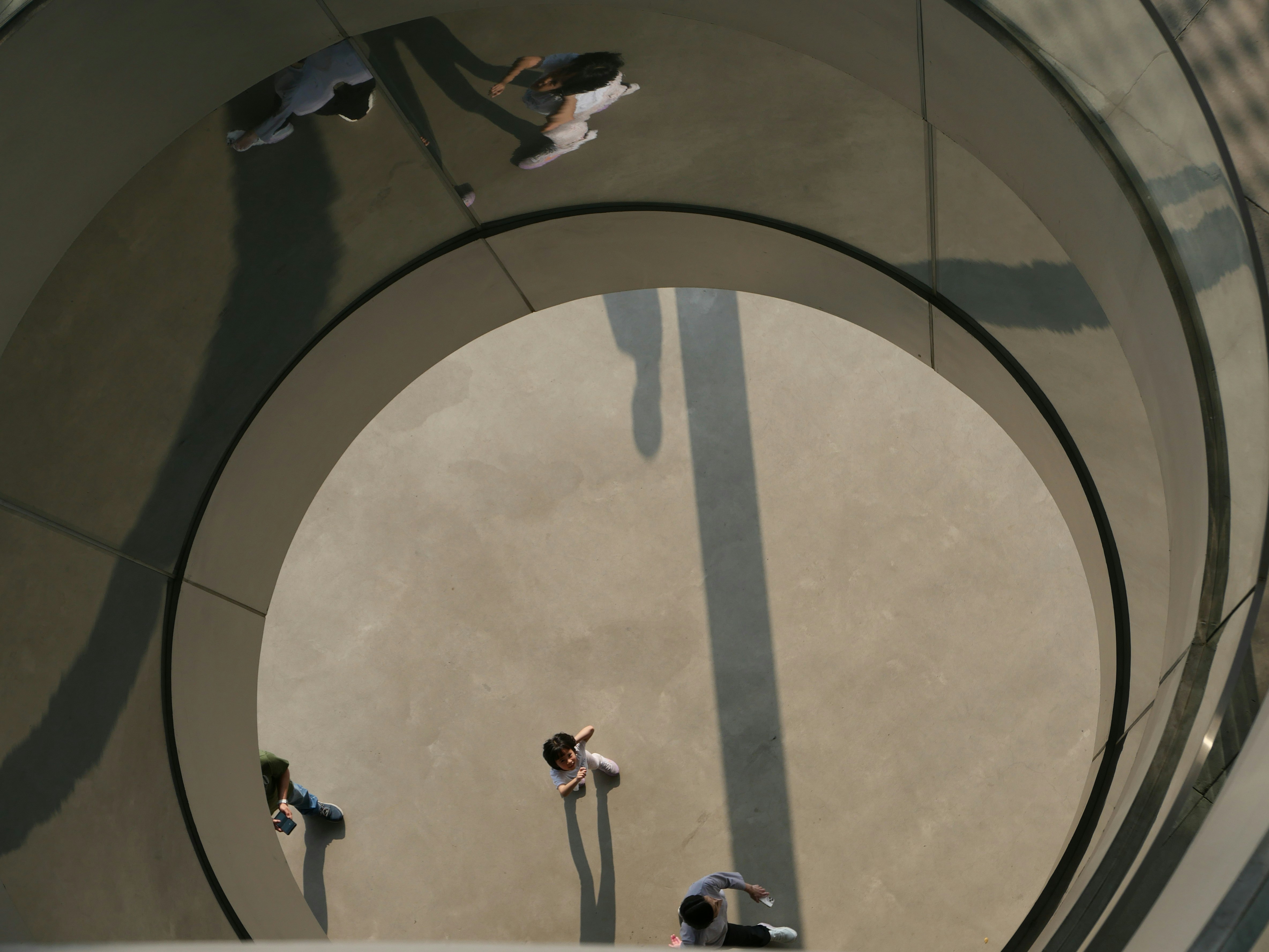 Circular Atrium: Minds and Shadows within a Drum