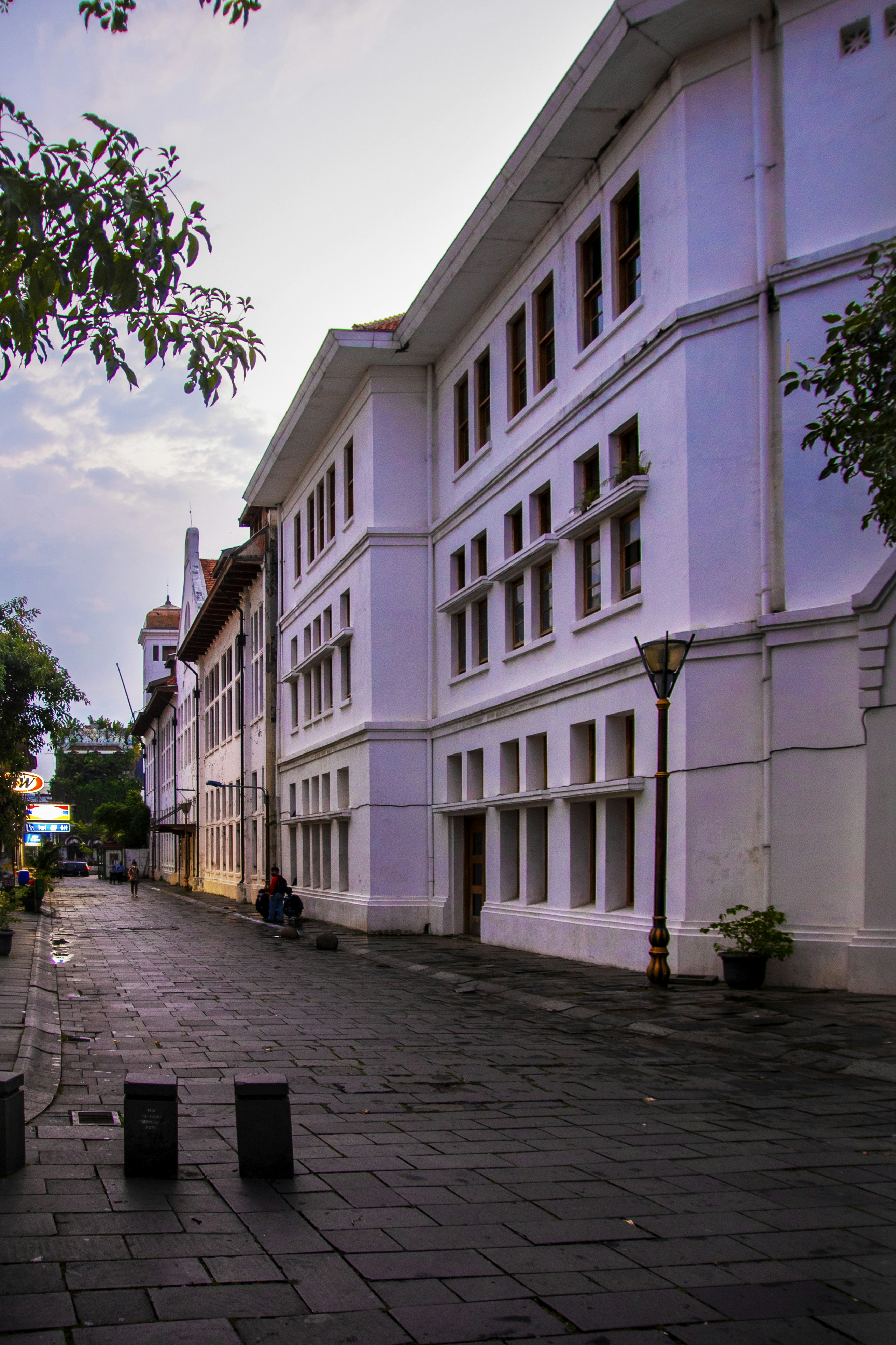 White Facade on a Quiet Lantern-lit Street