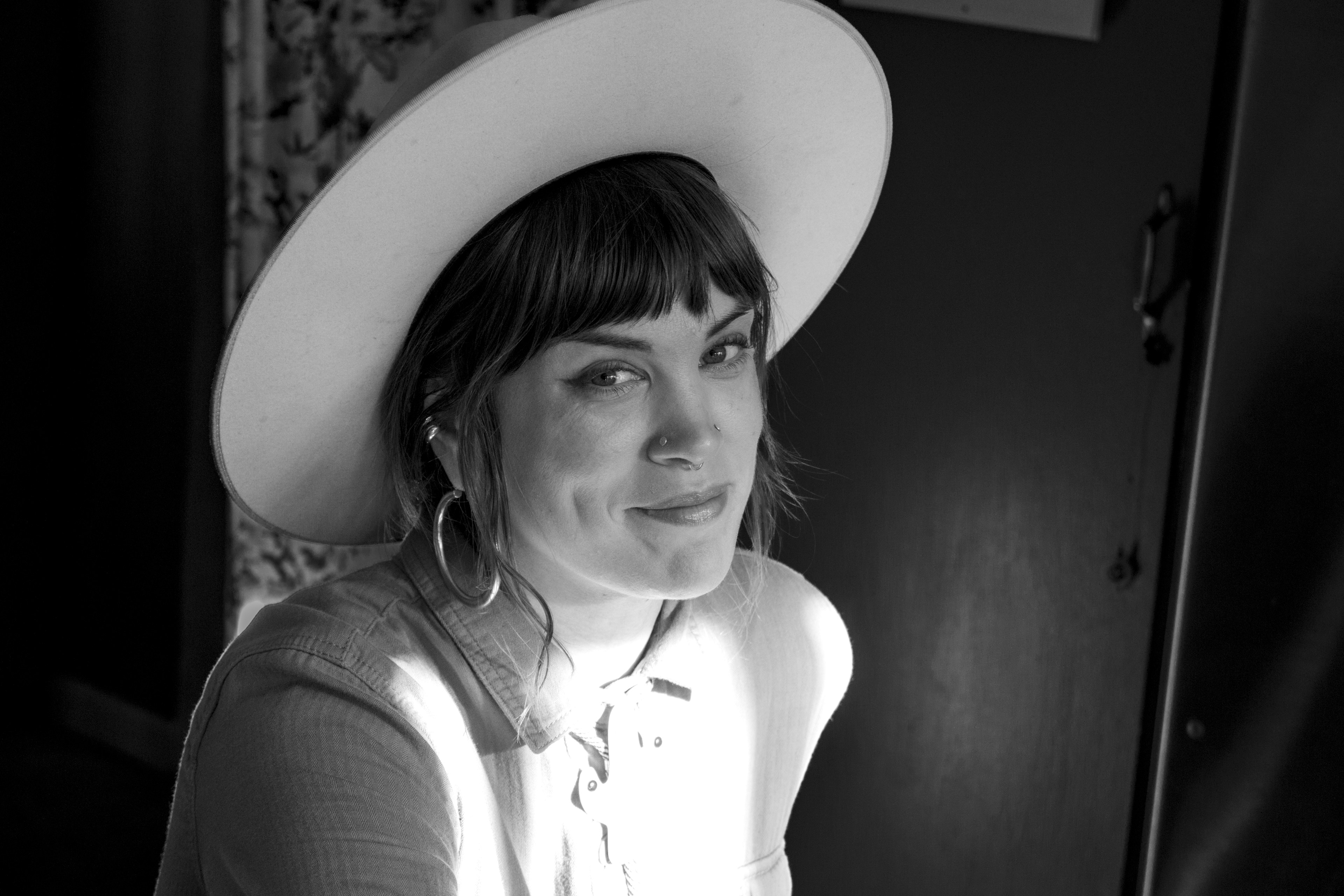 Soft Light, Wide Smile: A Portrait in Quiet Confidence