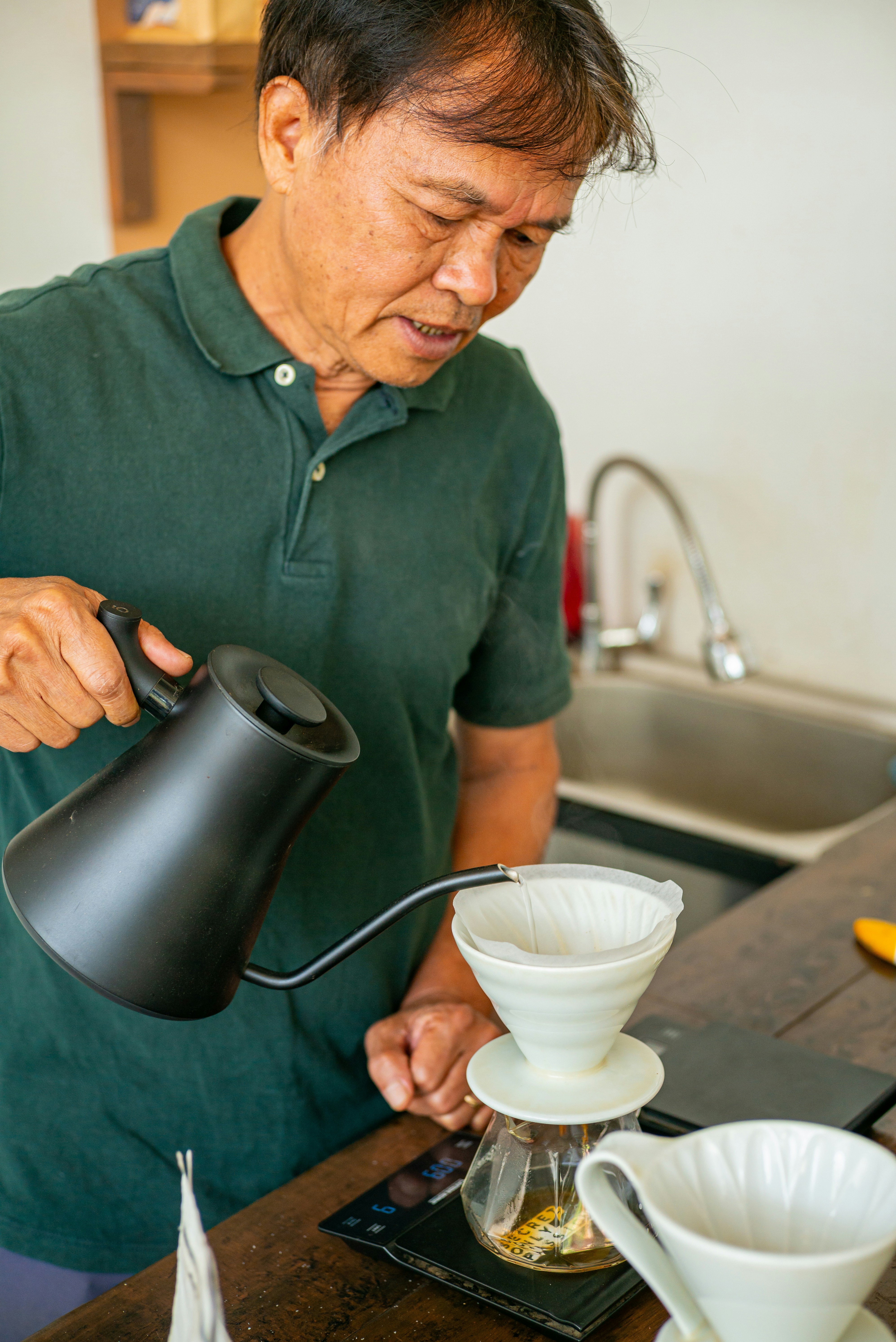 Pouring Precision: A Barista's Pour-Over Moment