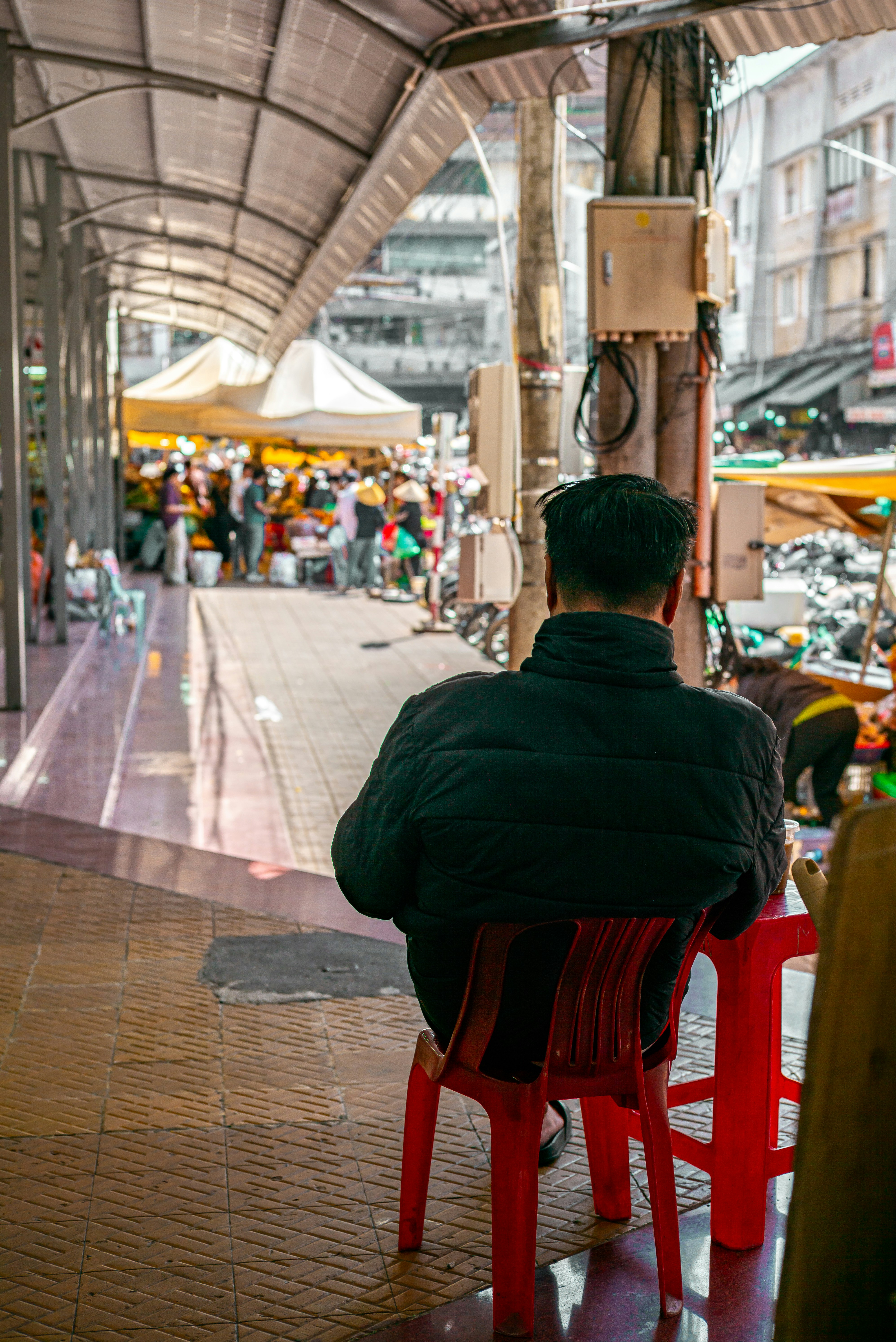 Back to the Market: A Pedestrian Portrait in a Busy Street Eatery
