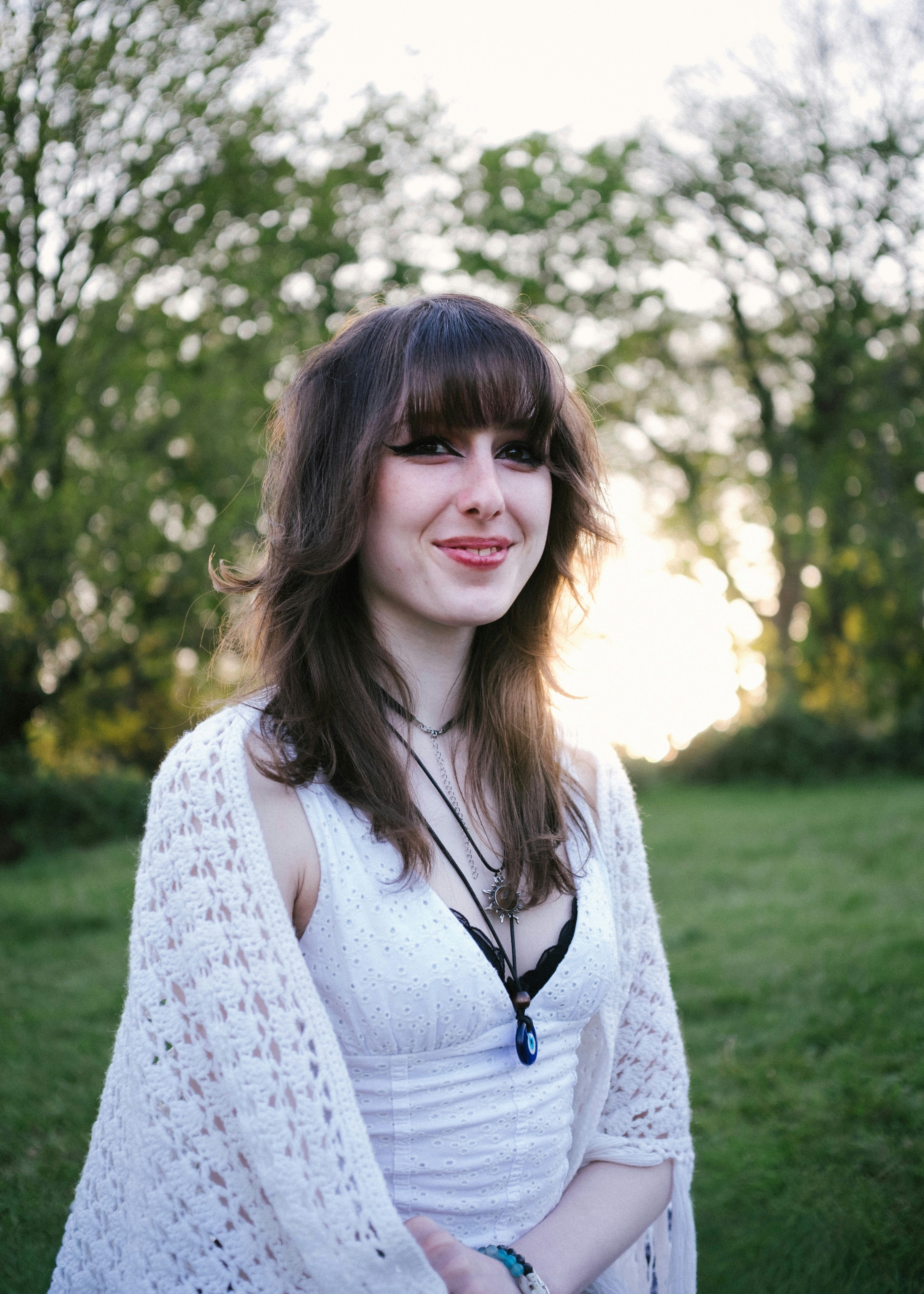 Soft Sunset Portrait of a Woman in a White Knit