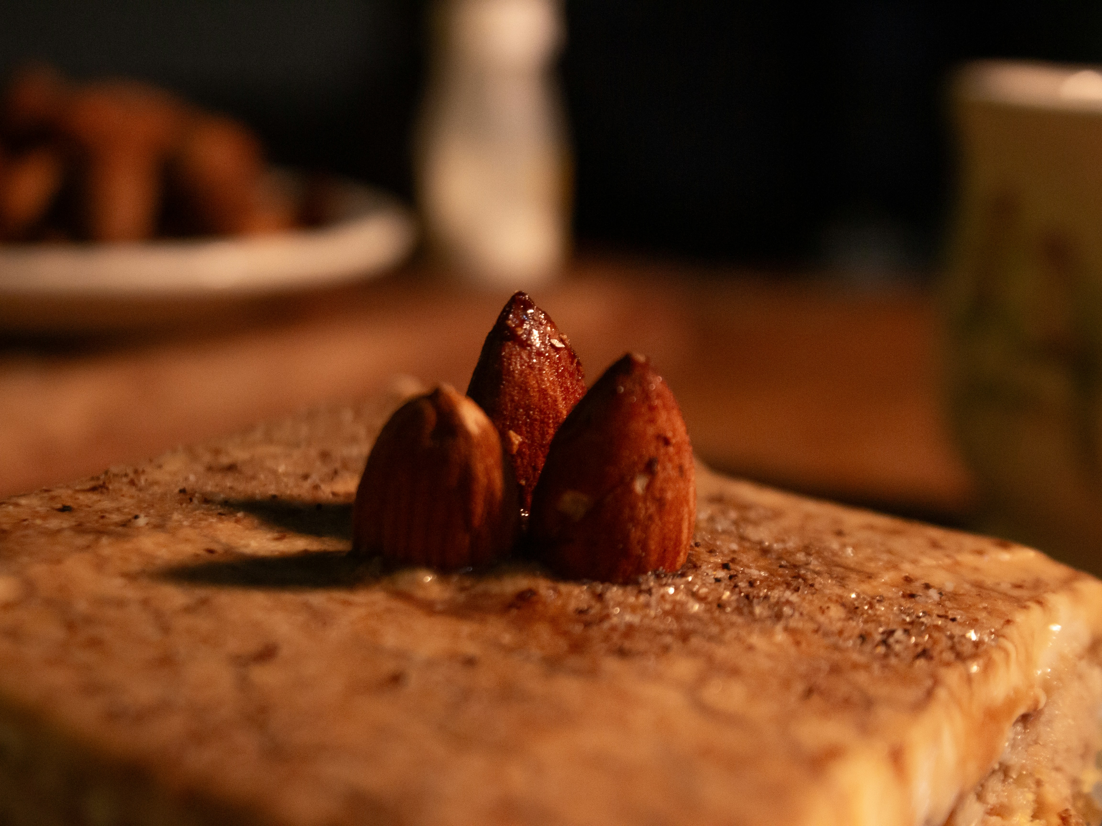 Hazelnut-topped glaze: a close-up on a creamy dessert's trio