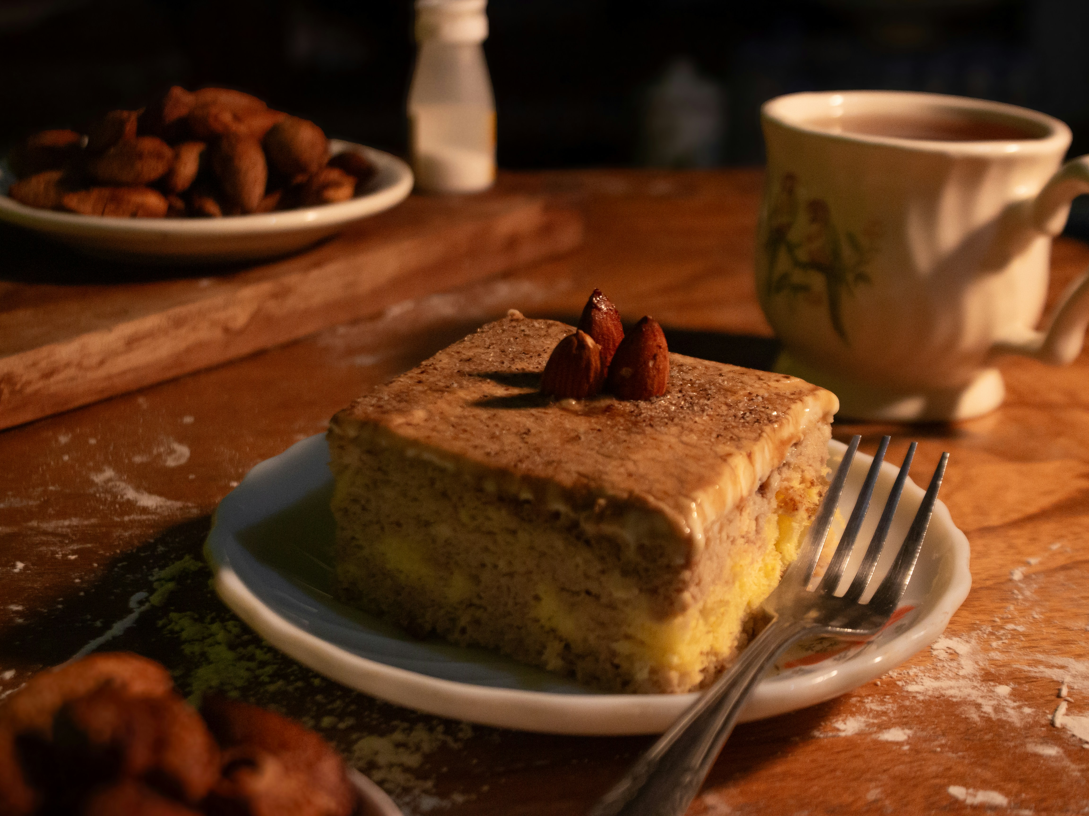 Slice of Afternoon Spongy Custard: A Portrait of Coffee and Cake on a Rustic Table