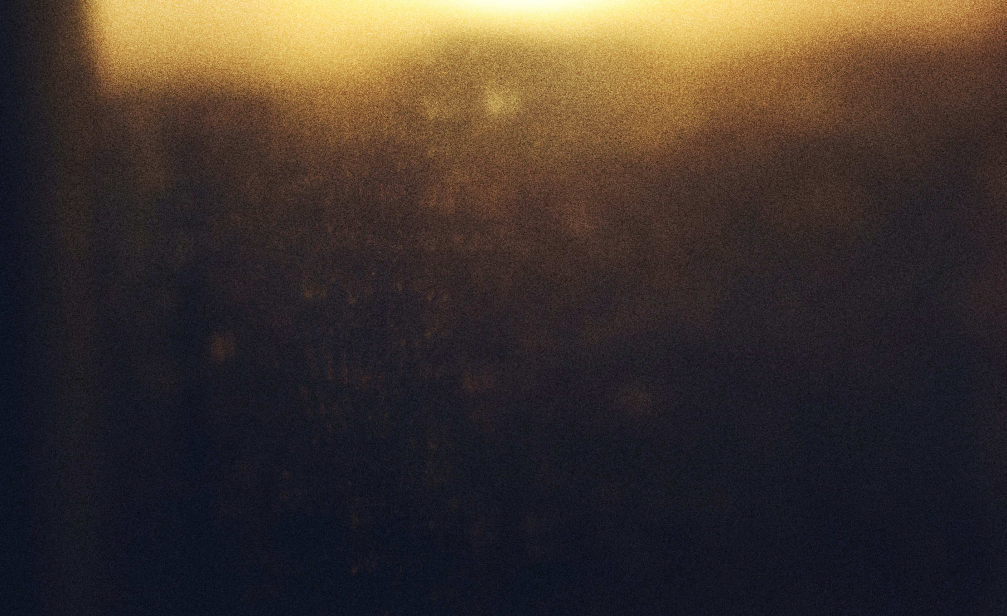 Hazy Glimmer on a Dark Horizon