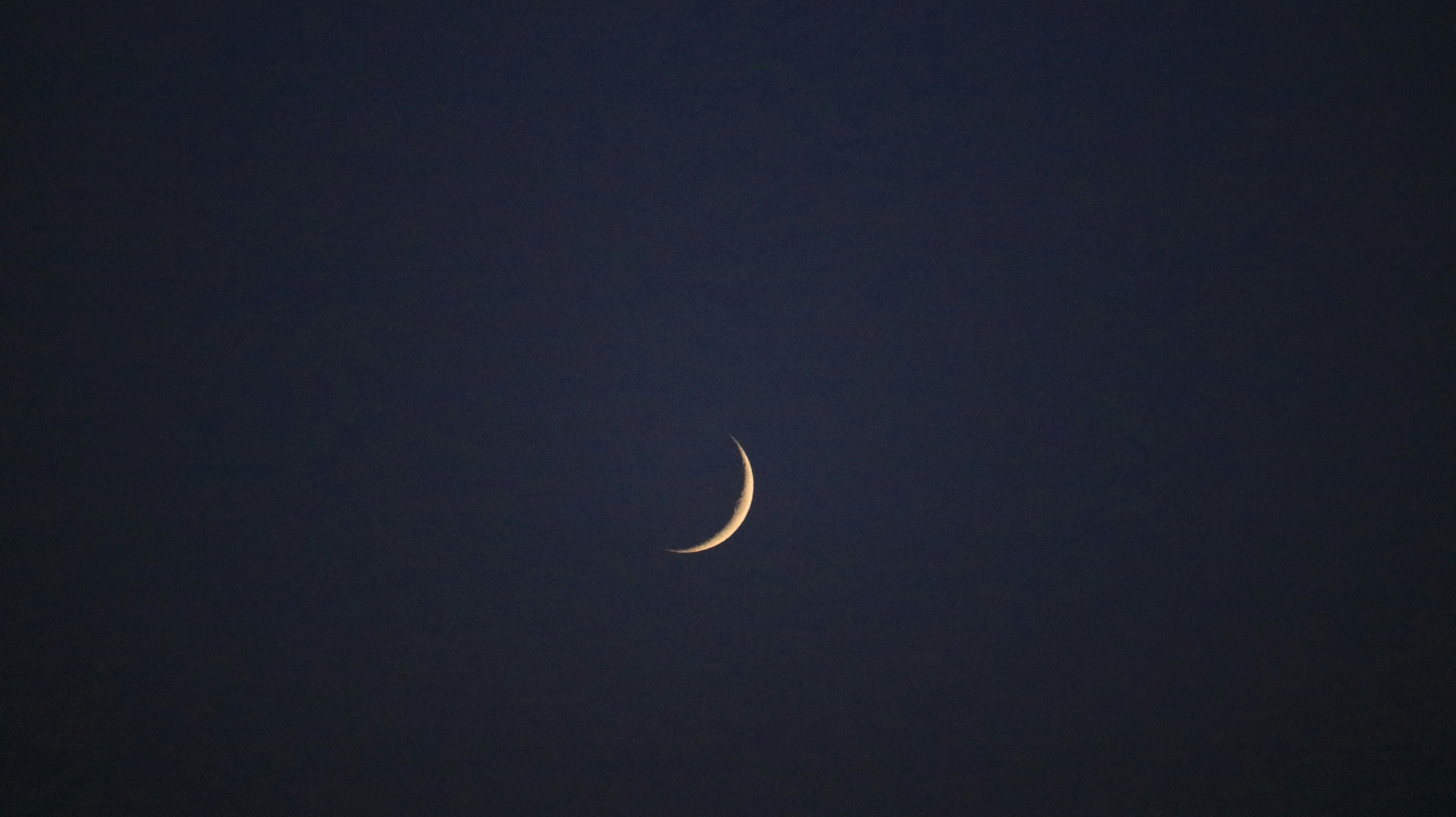 Crescent Quiet: A Moonlit Sliver in a Velvet Night
