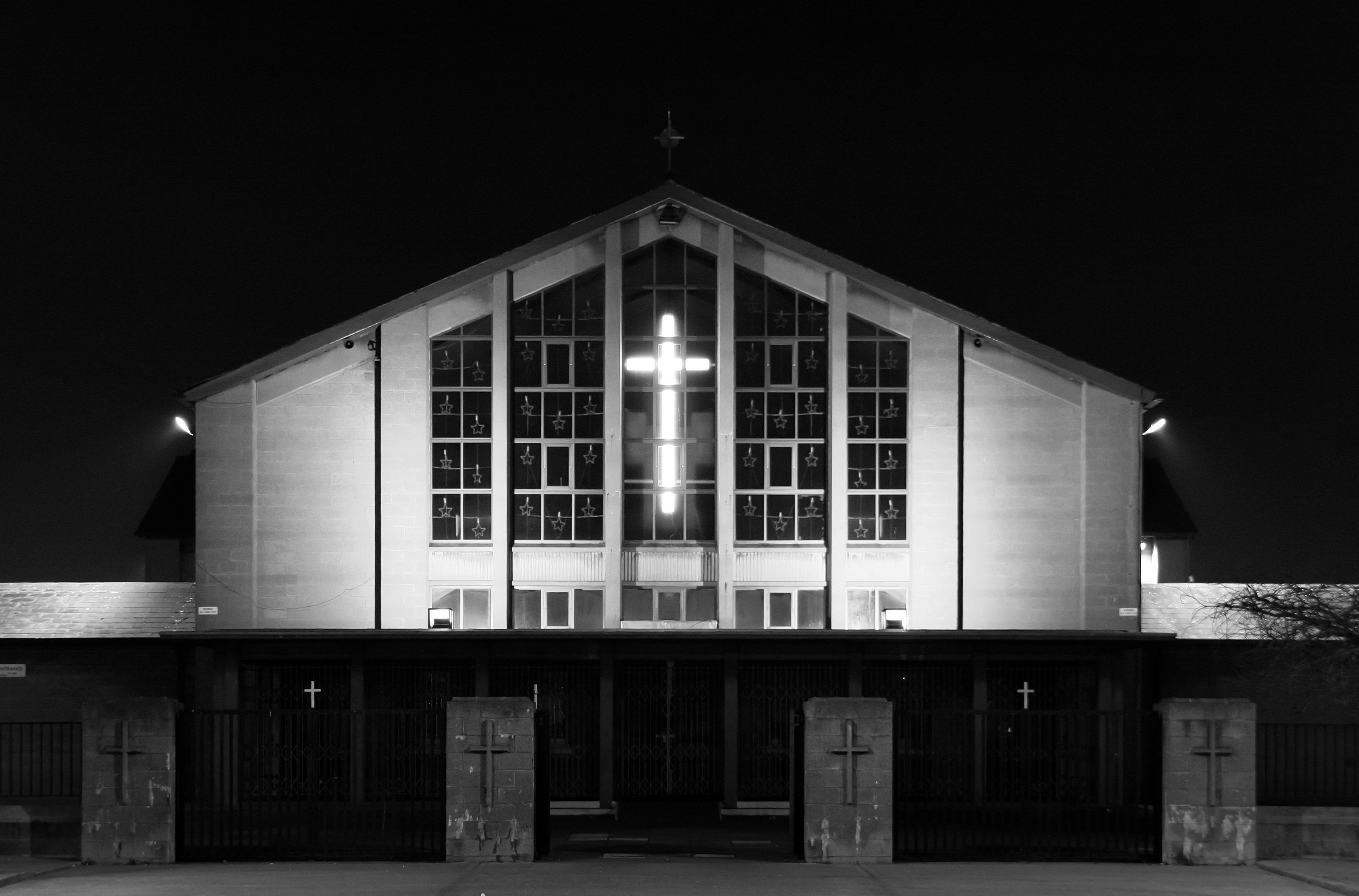 Monochrome Sanctuary: Night Facade of a Modern Church
