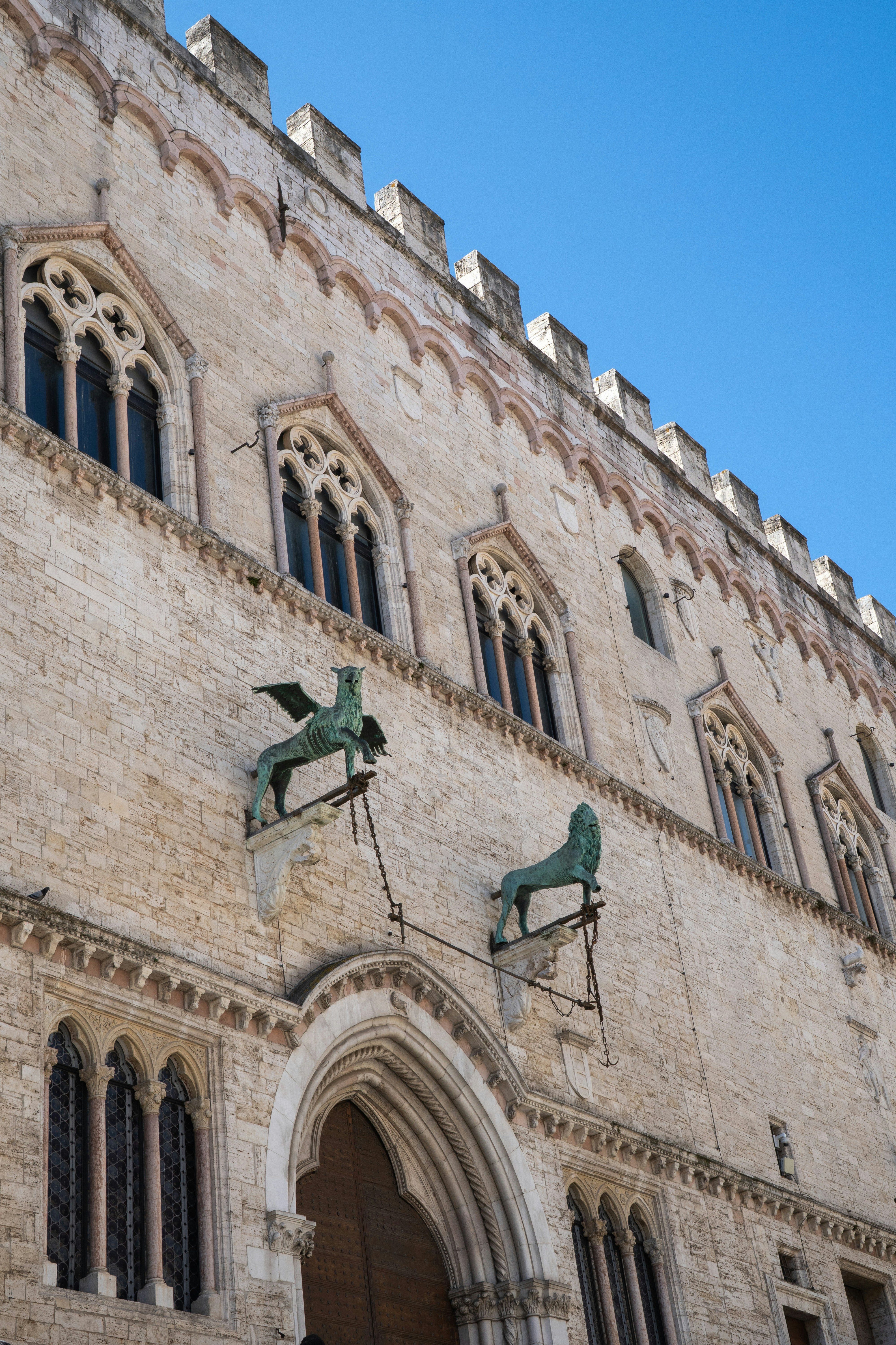 Winged Lions Guard the Stone Facade