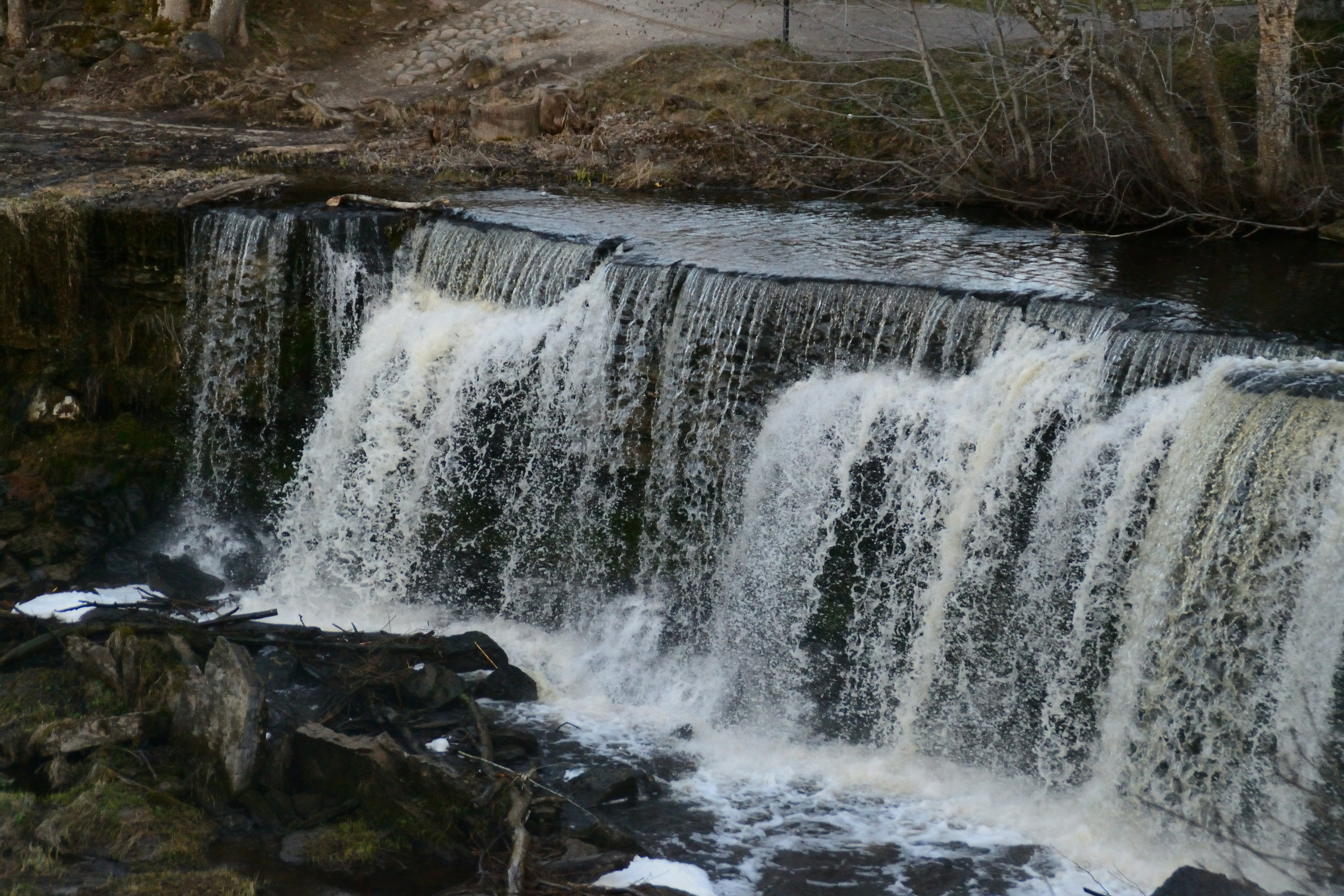Waterfall Curtain: A Quiet Cascade over Stone Edges