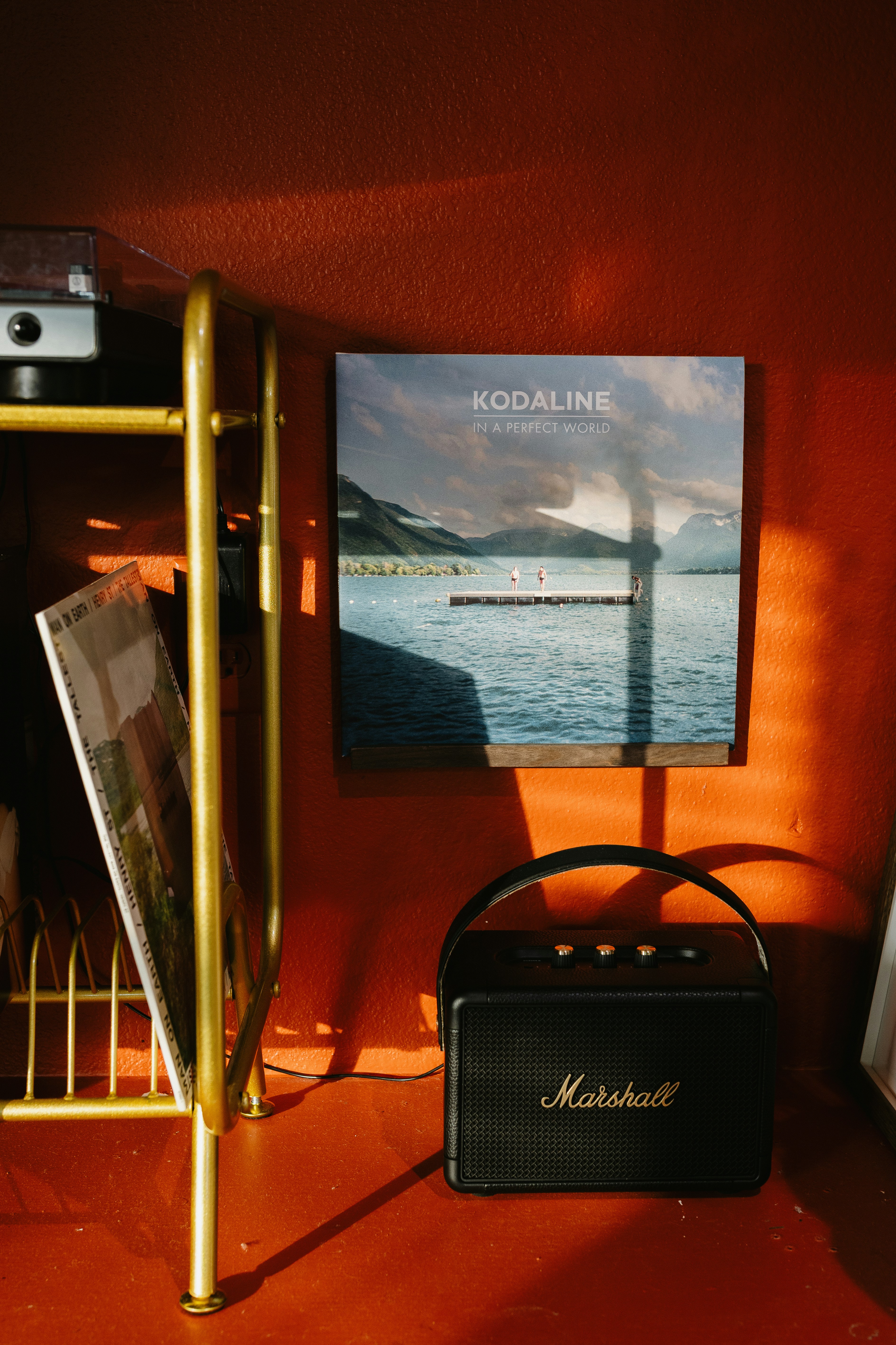 Amber Wall Studio: A Cozy Nook with Sunset Light on a Dock Photo