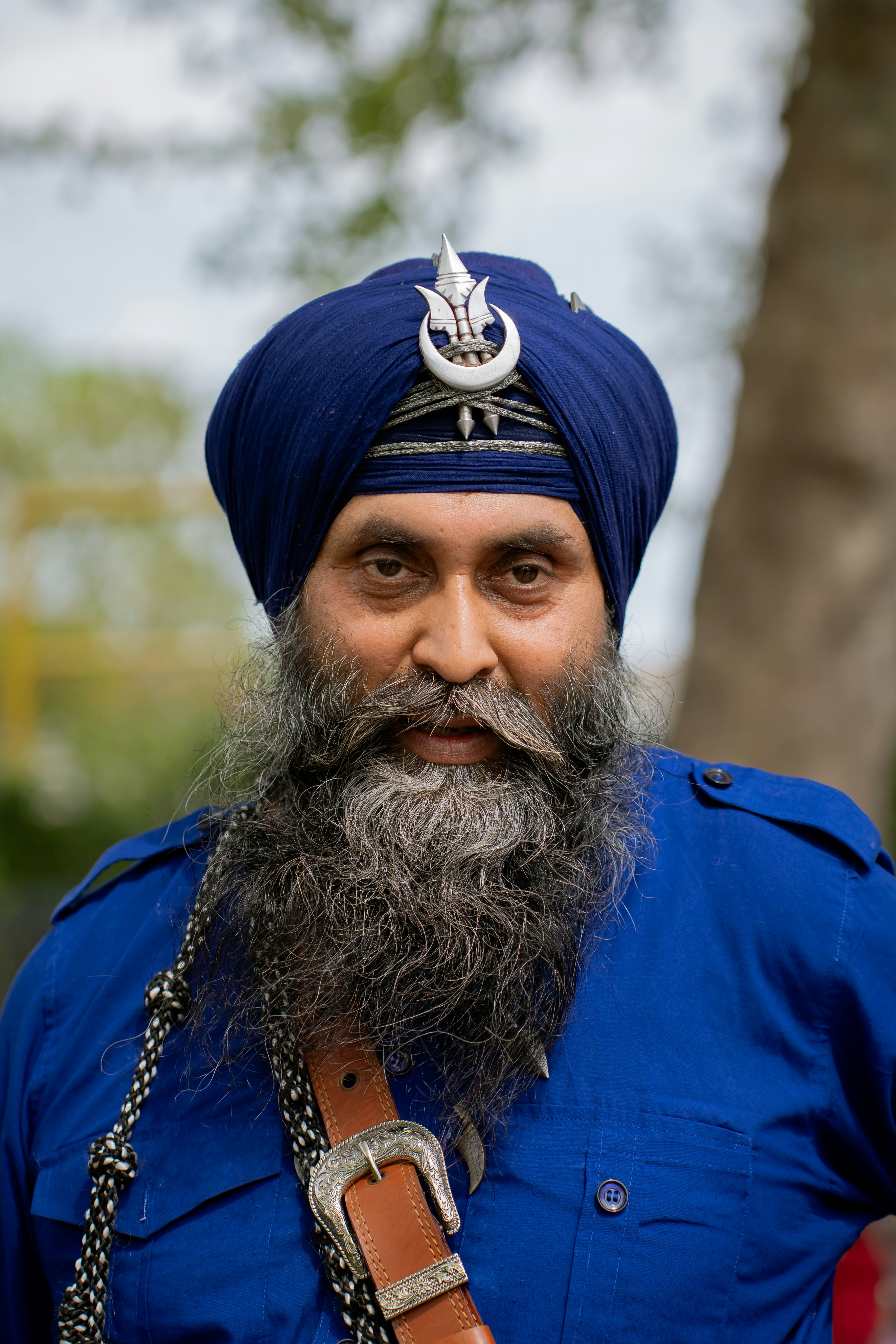 Regal Turban, Steel Emblem: A Portrait of Quiet Authority