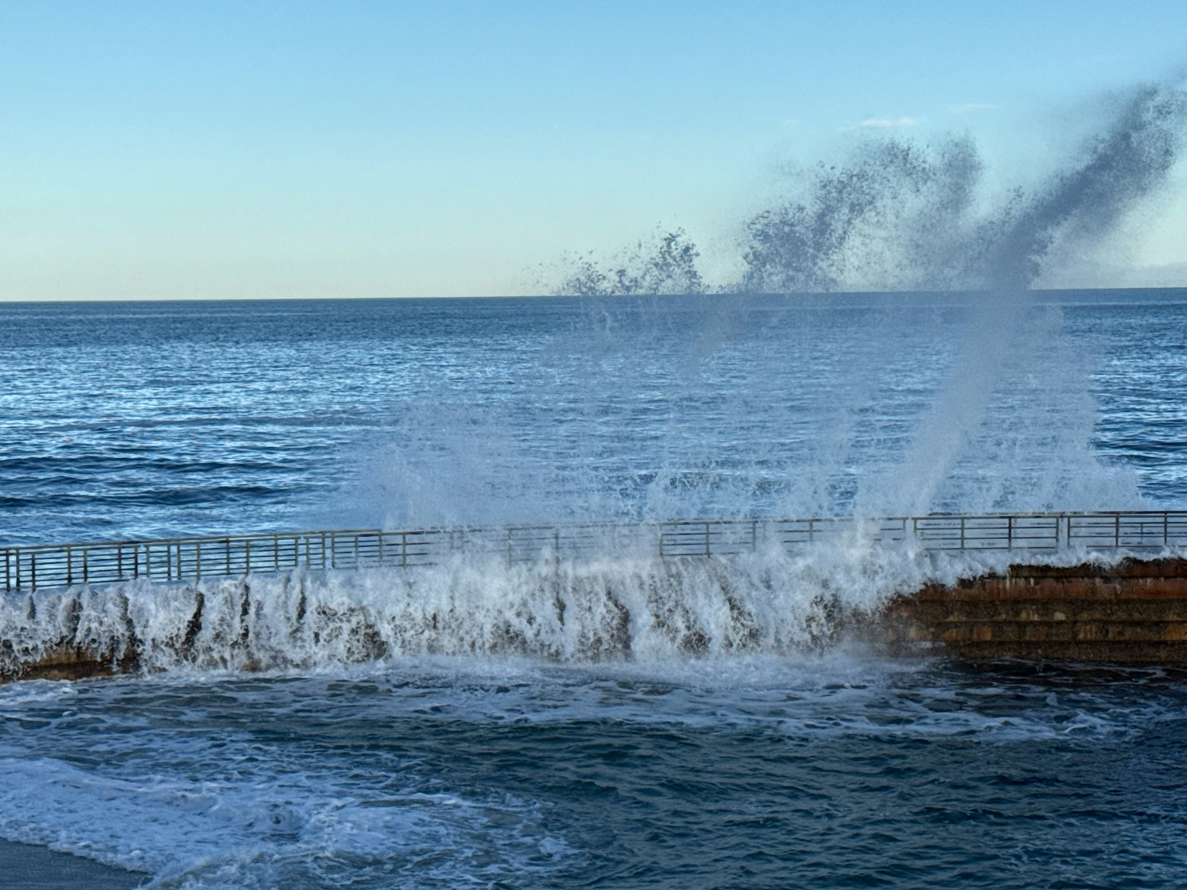 Ocean Wall: A Breakwater Breathes as Waves Collide