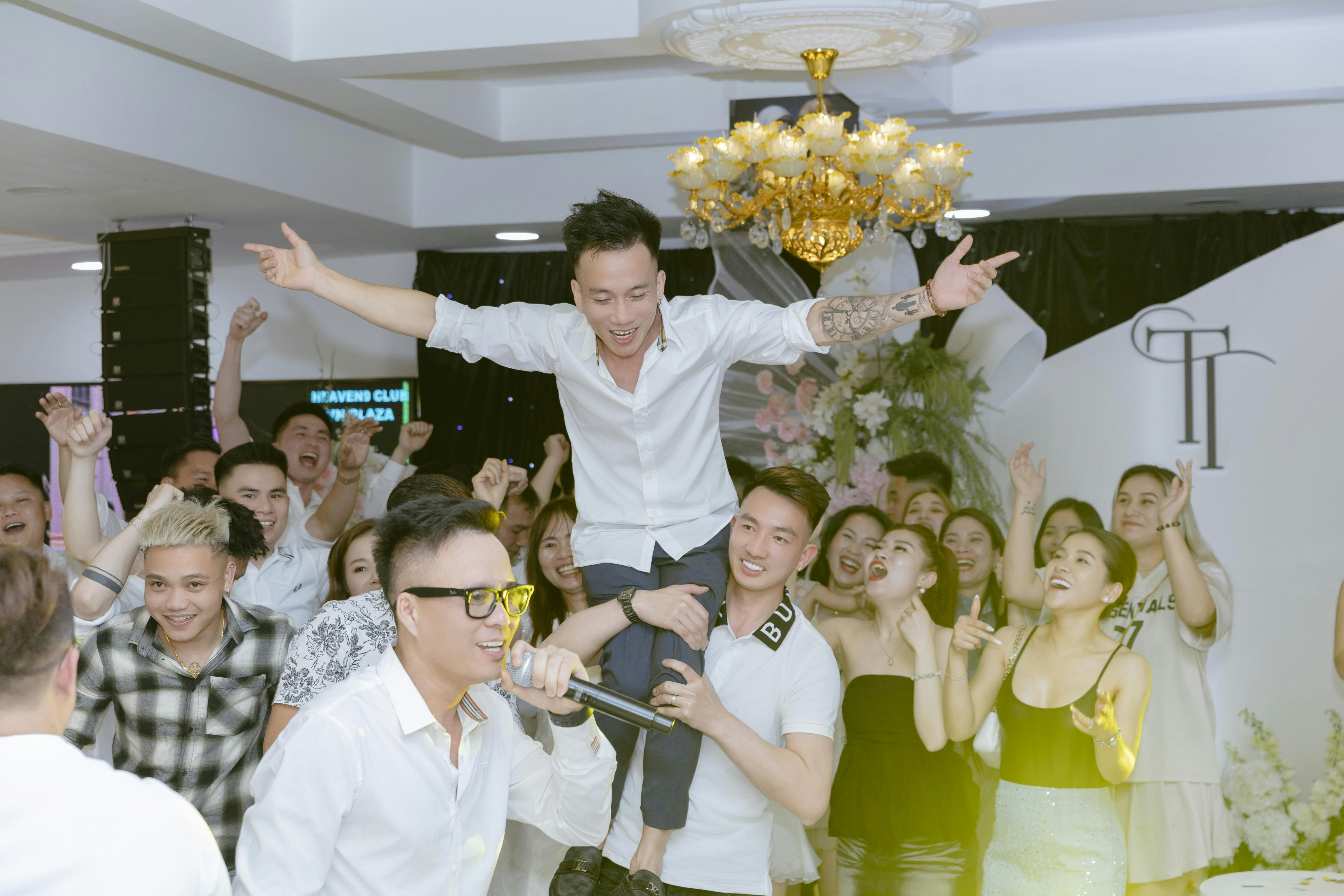 Crowd Surf in a Club: A Portrait of Celebration
