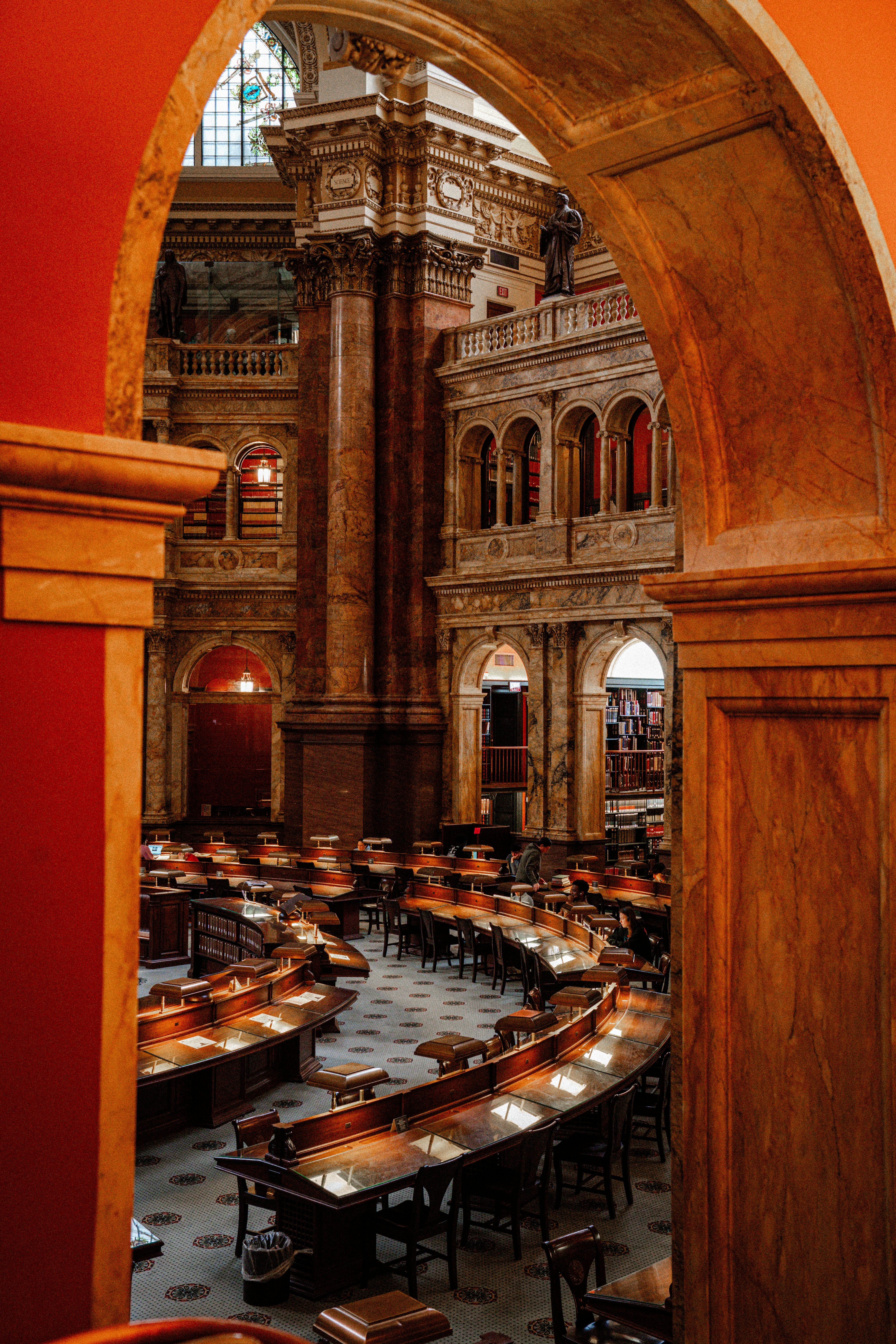 Arcade of the Archive: A Grand Reading Hall Framed by Red Archways