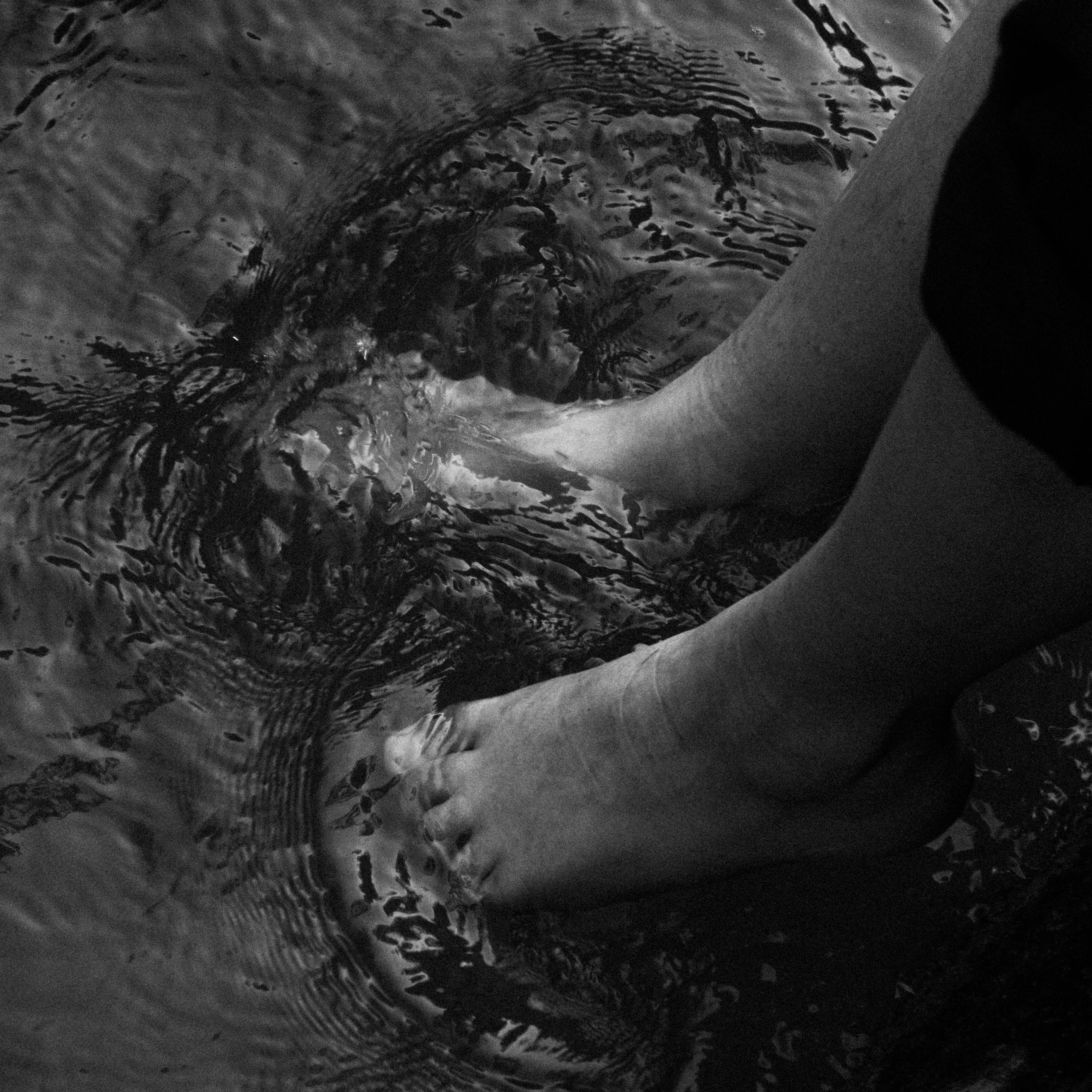 Footprints in Quiet Water: A Moment of Solace