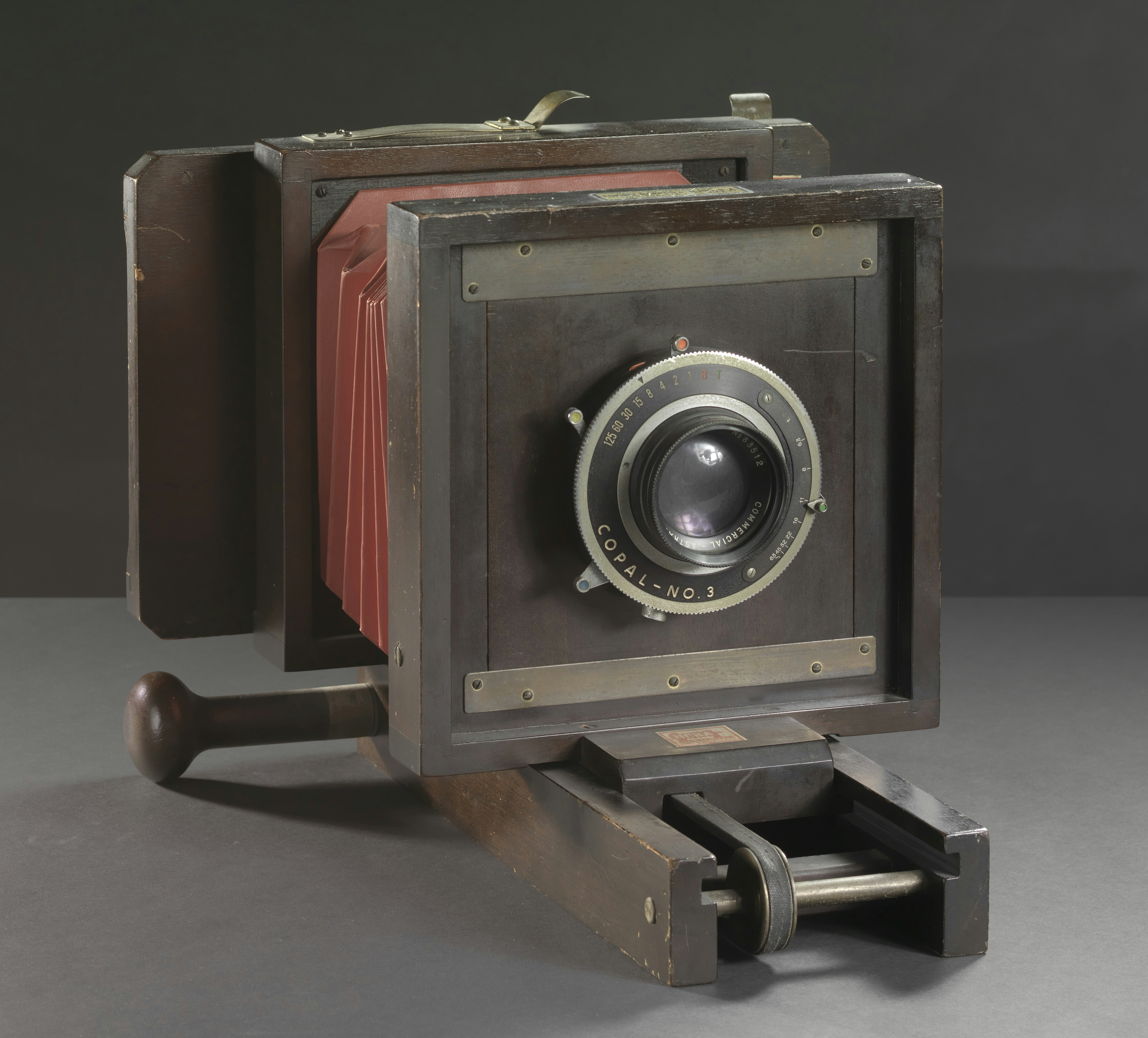 Wooden Field Studio Portrait: a vintage camera ready for a shot