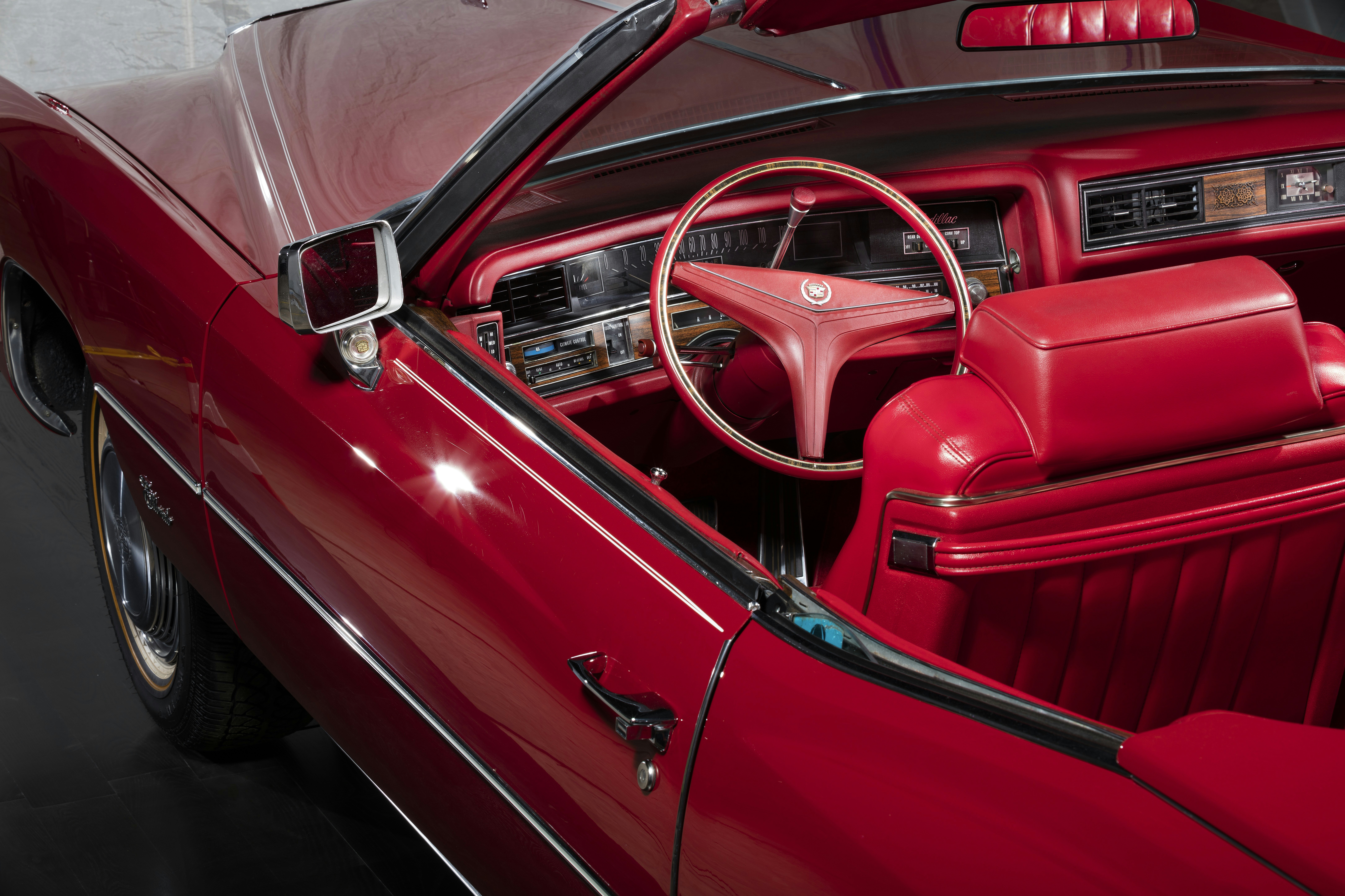 Crimson cockpit: a gleaming vintage interior bathed in red