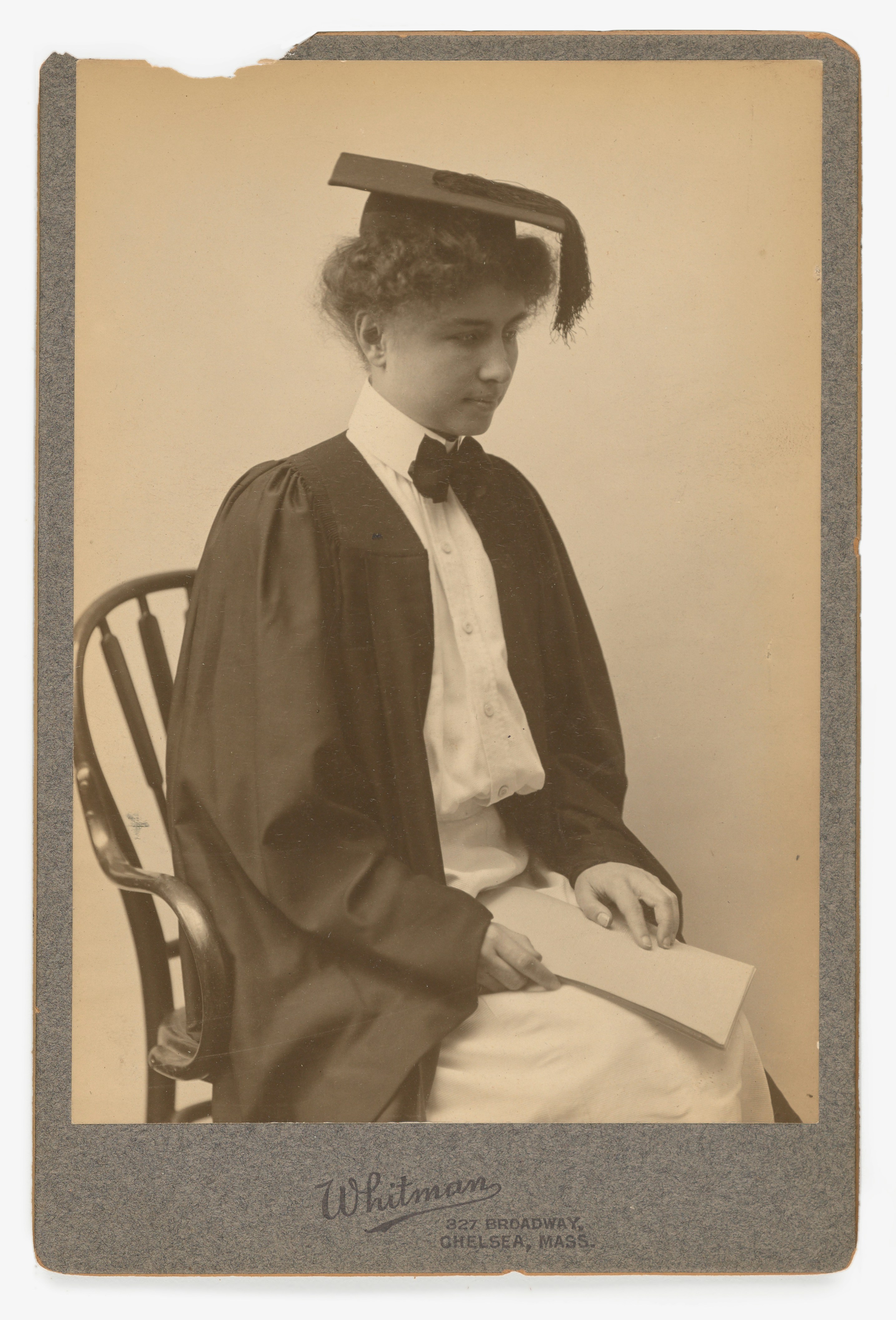 Gentlemanly Graduation: A Vintage Portrait in Sepia