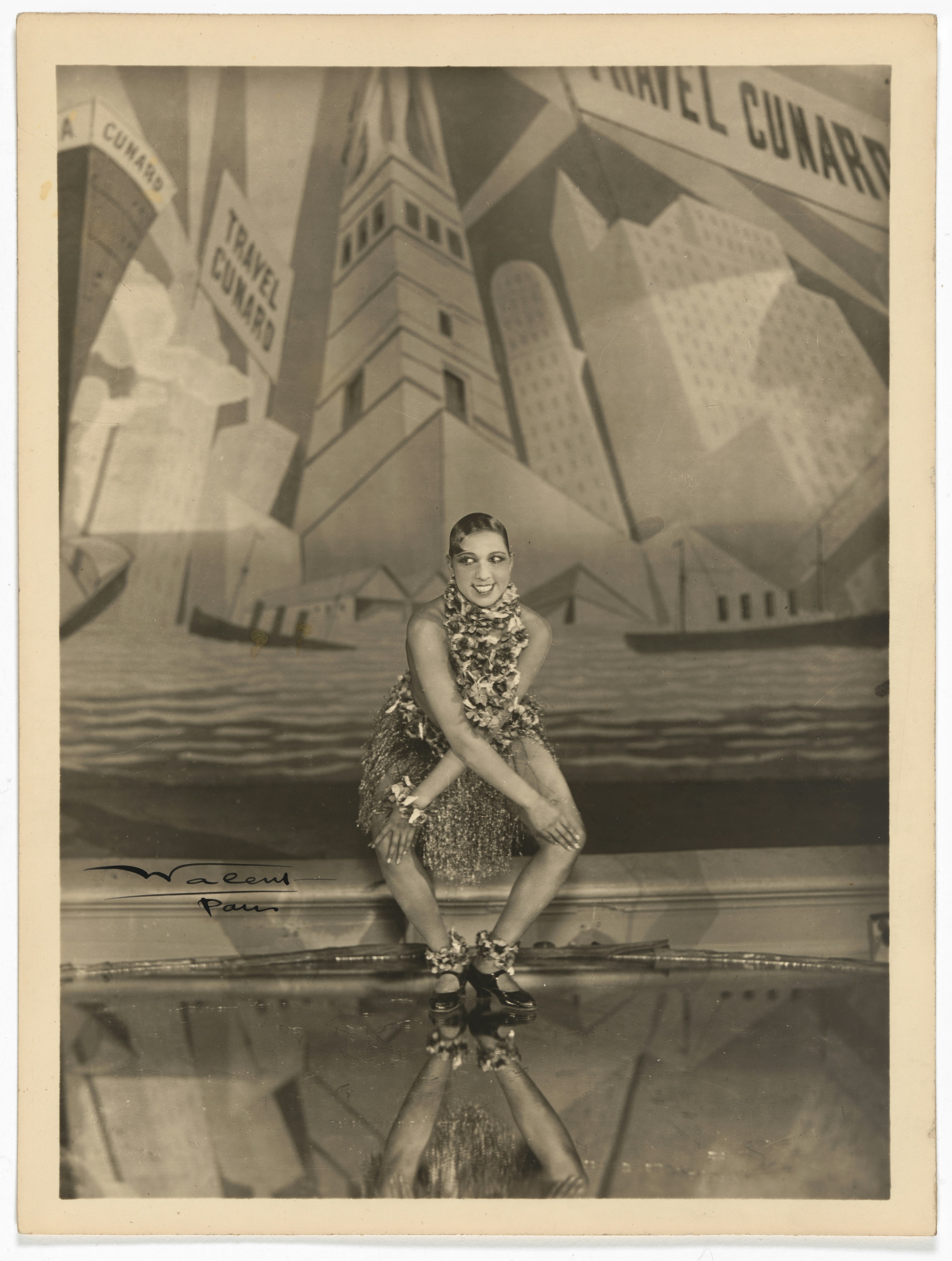 Stage Angel on the Water: A Dancer at the Backdrop of Futuristic Facades