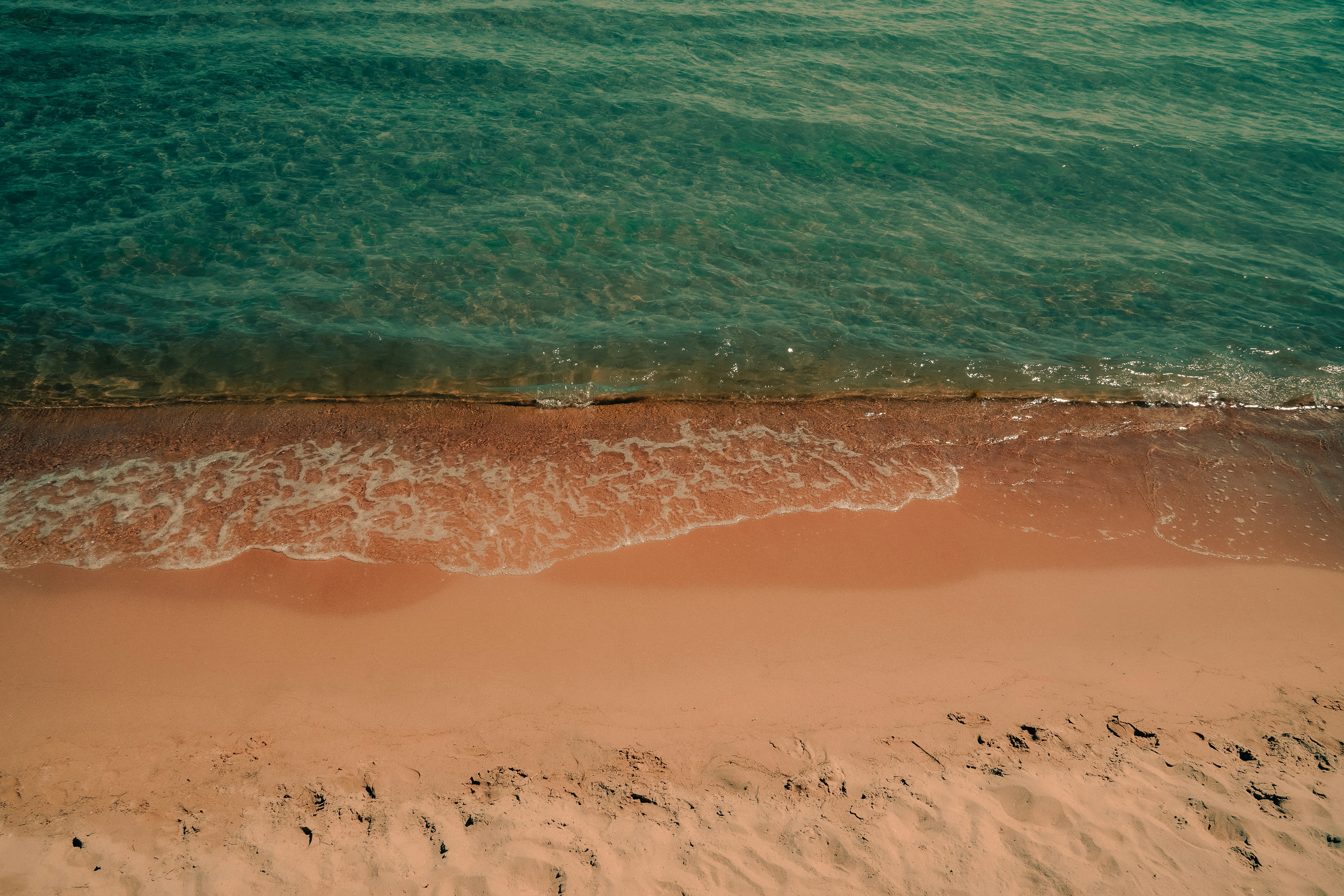 Coastal Lines: Tidal Edge Between Sea and Sand