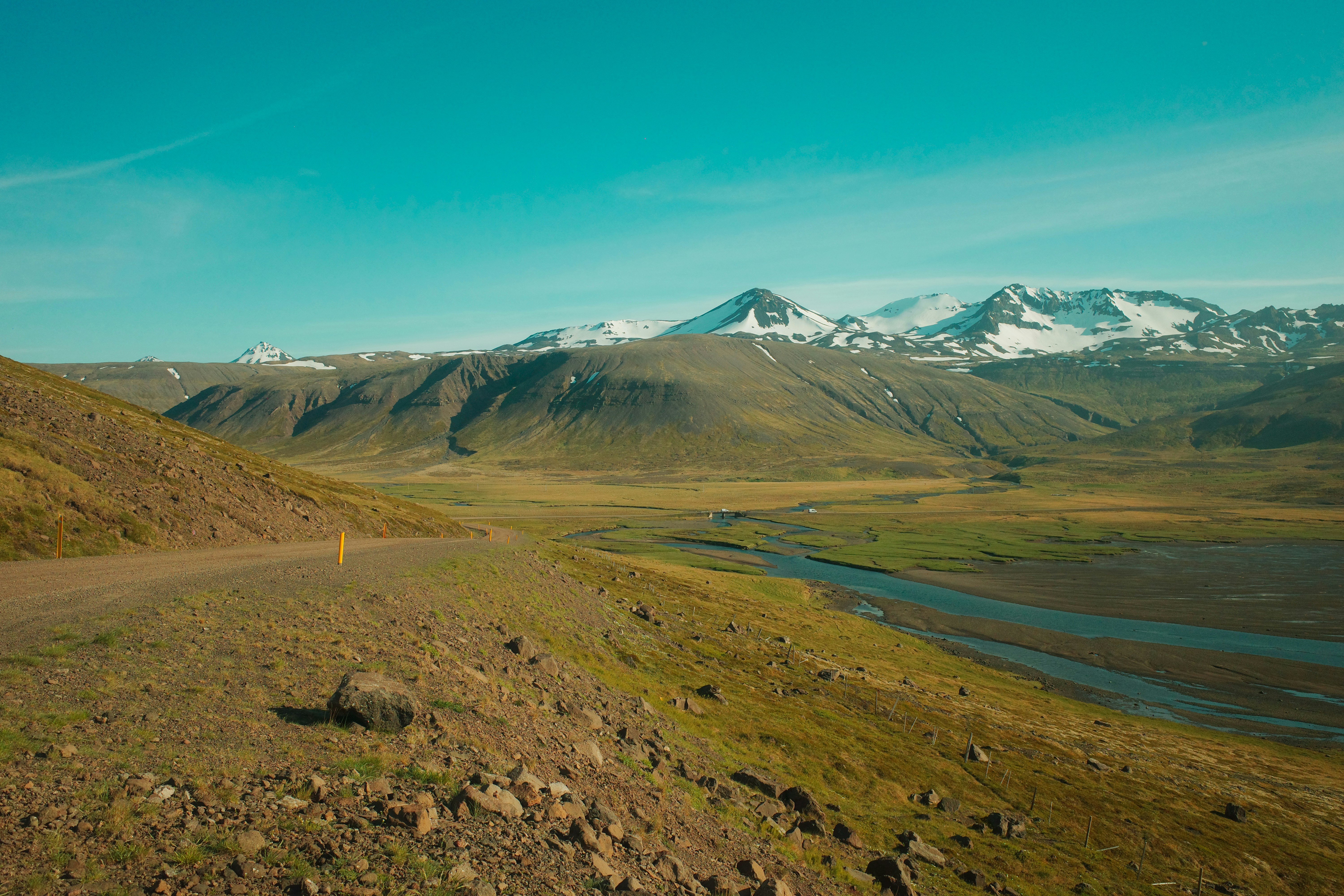 Glacial Ridge and River Bend Under a Carved Sky