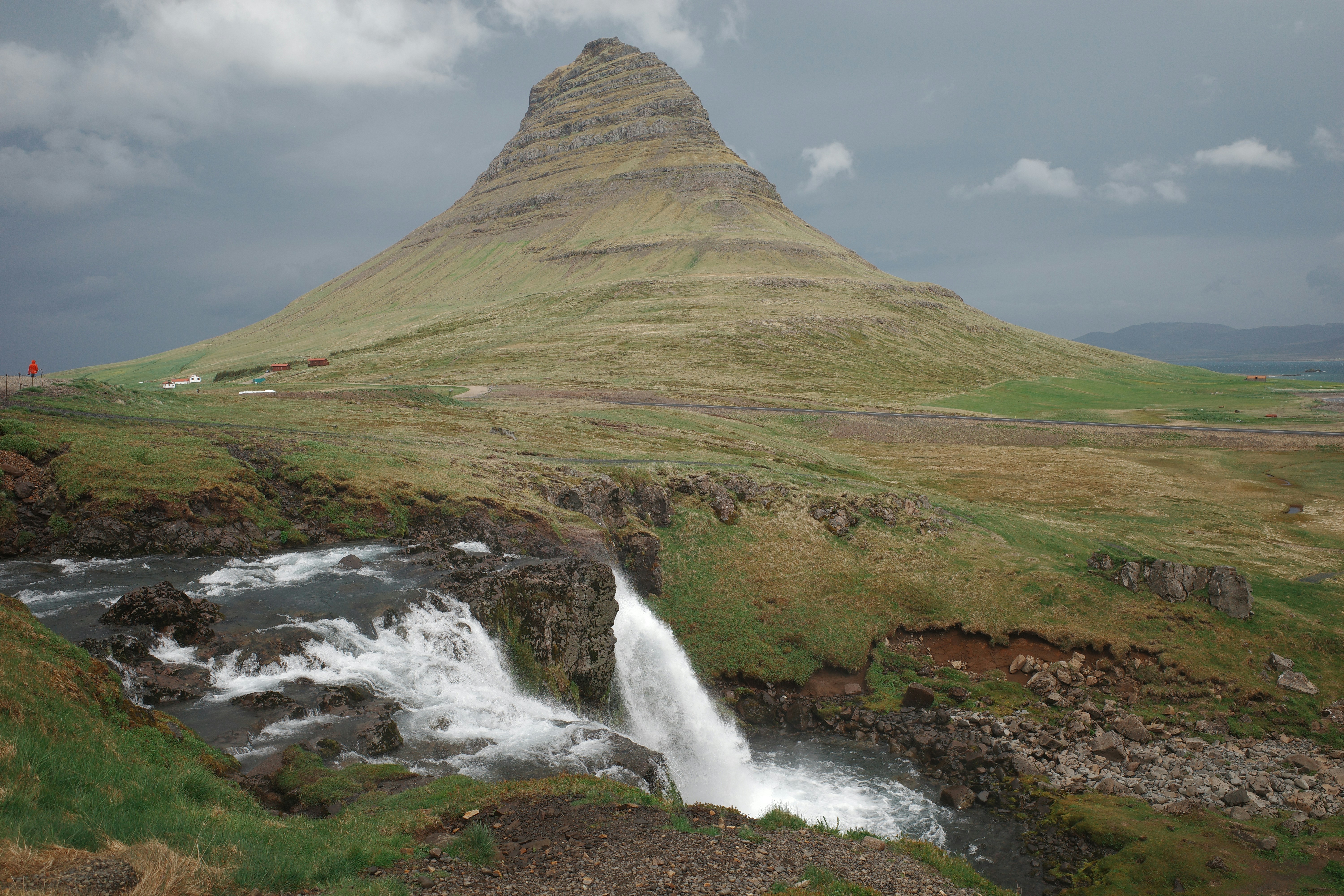 Cone of Iceland: a lone peak overlooking a cascading ravine