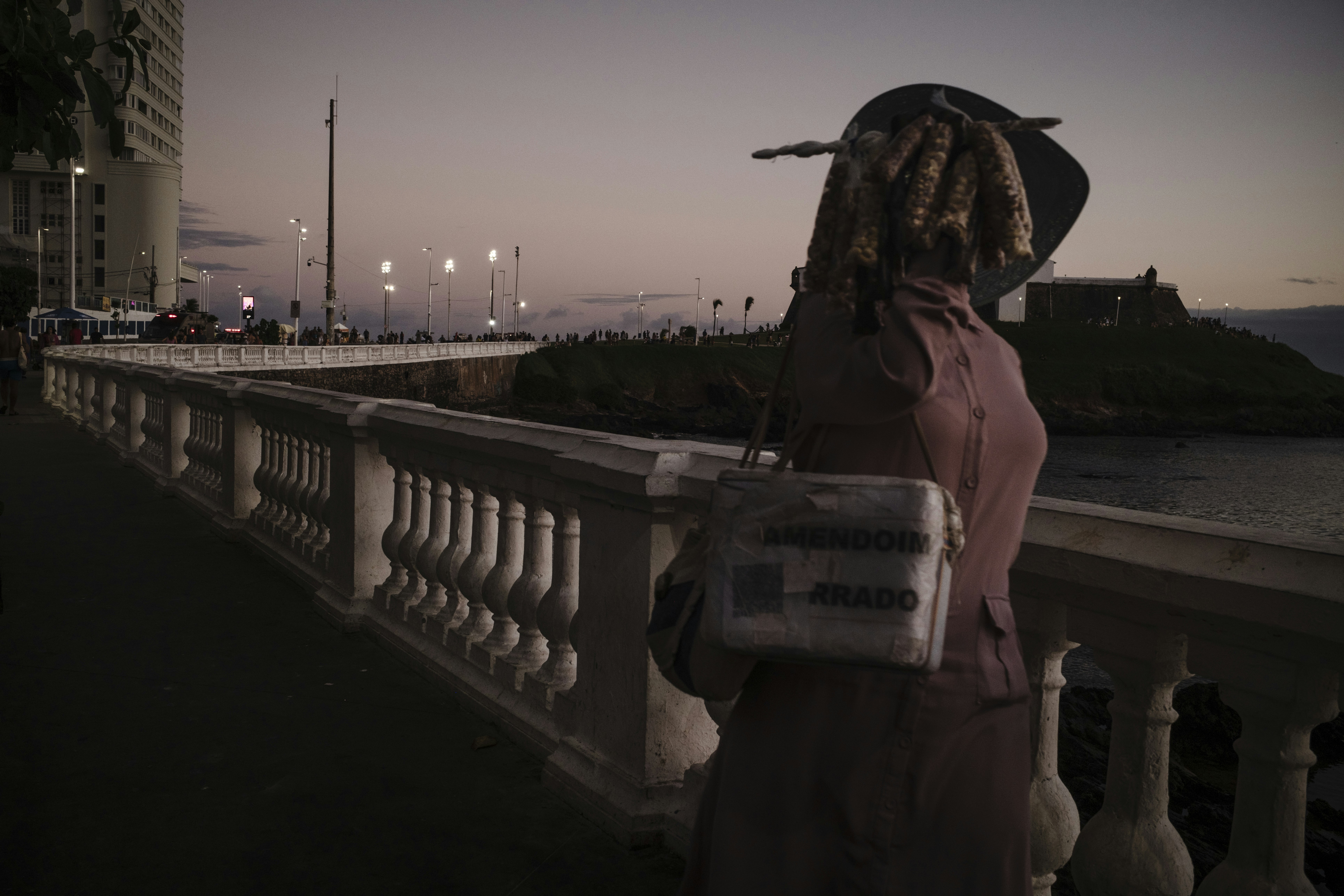 Evening silhouette on the seaside promenade