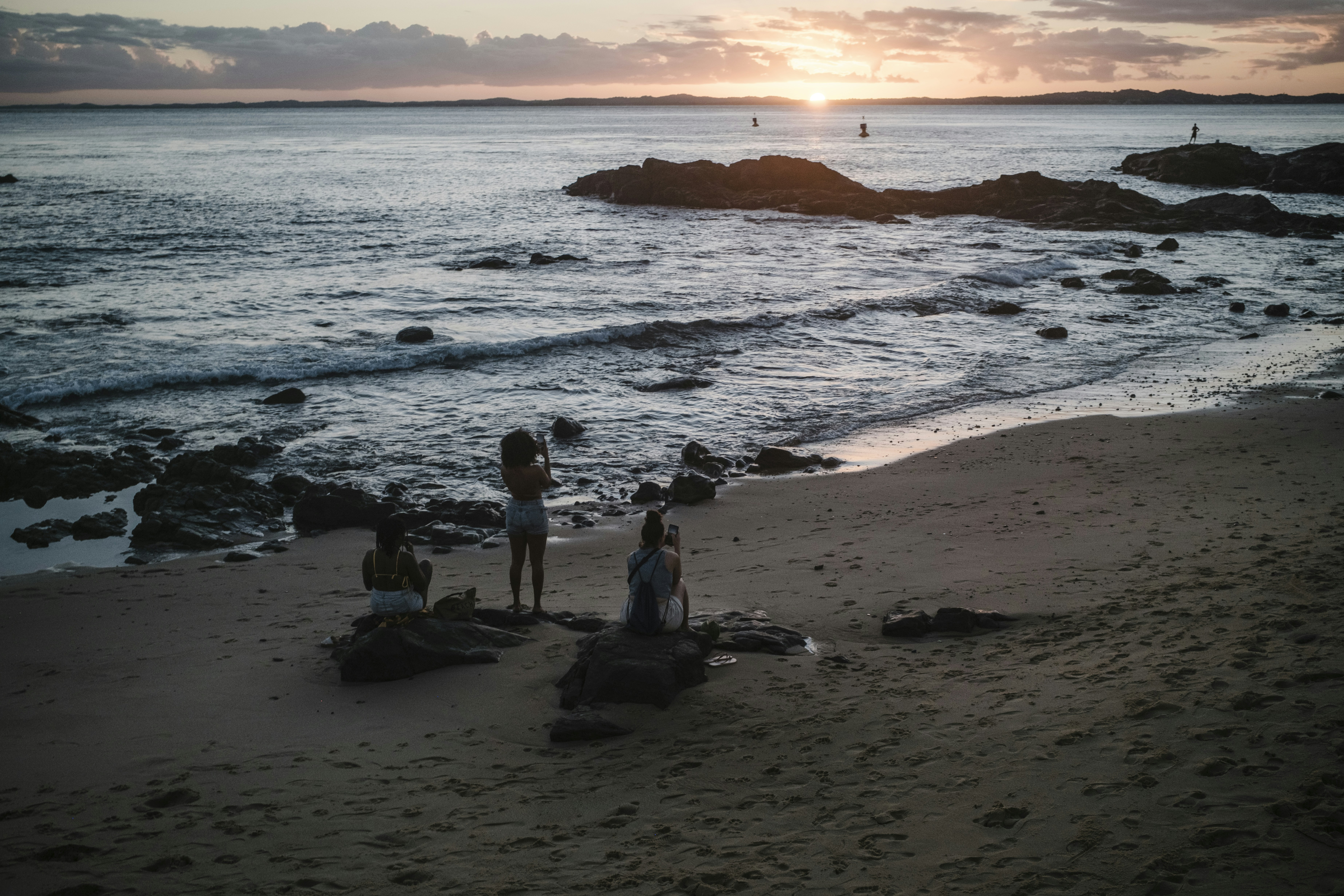 Kids by the Tide: Evening Light on a Quiet Bay