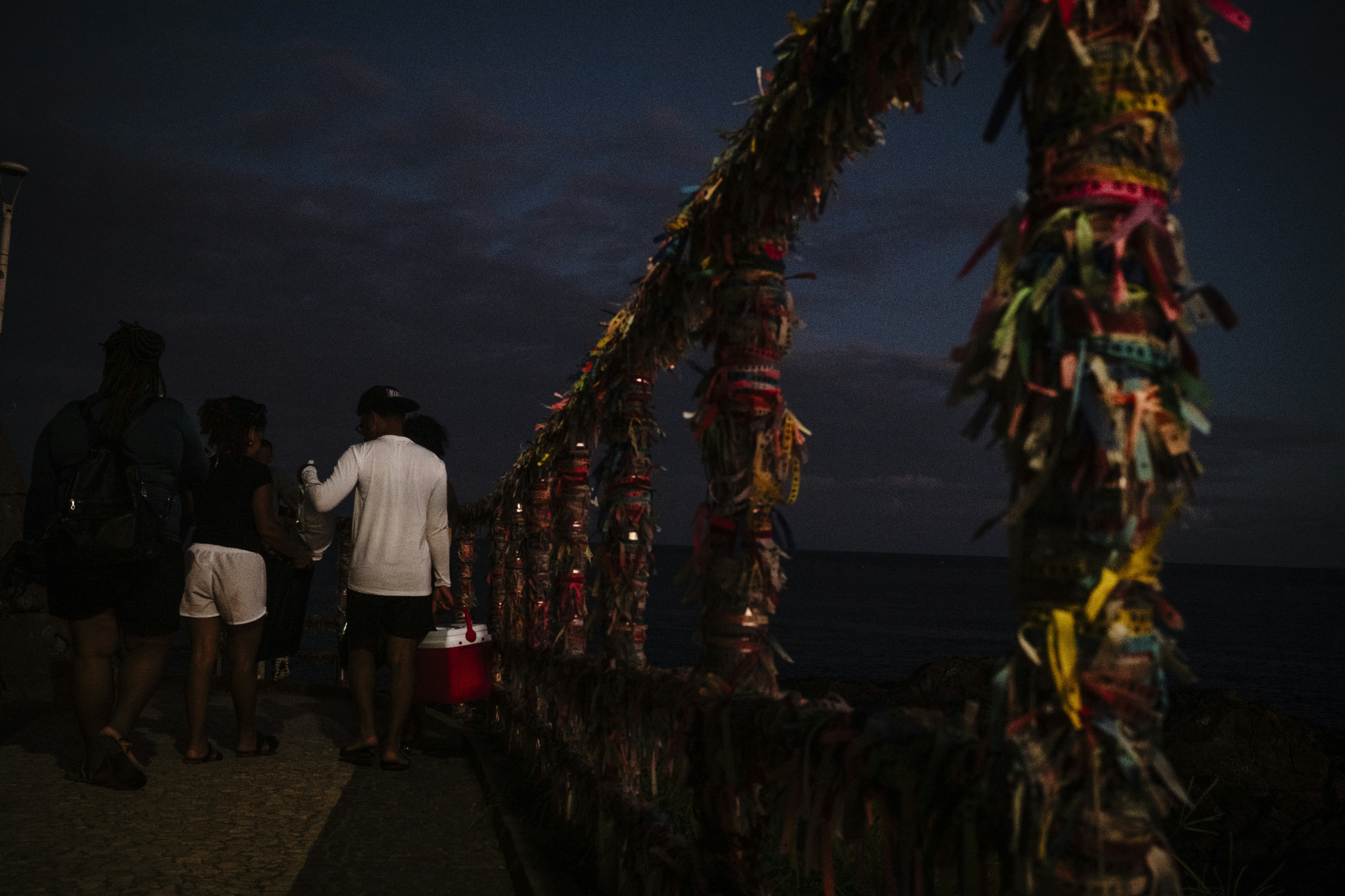 Overlooked Pier of Ritual Ribbons at Dusk