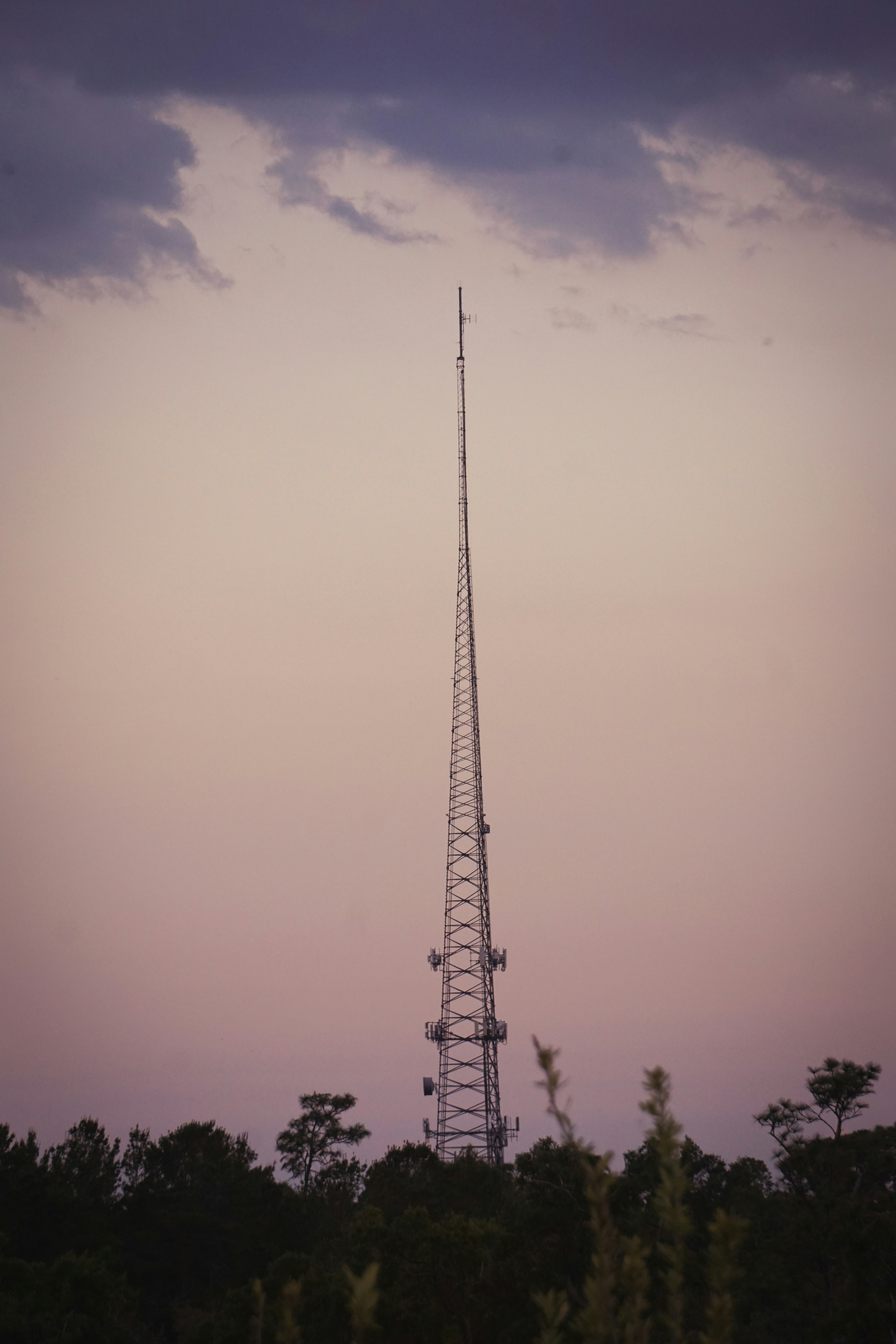Spires of Silence: A Tower Reaches into the Dusk
