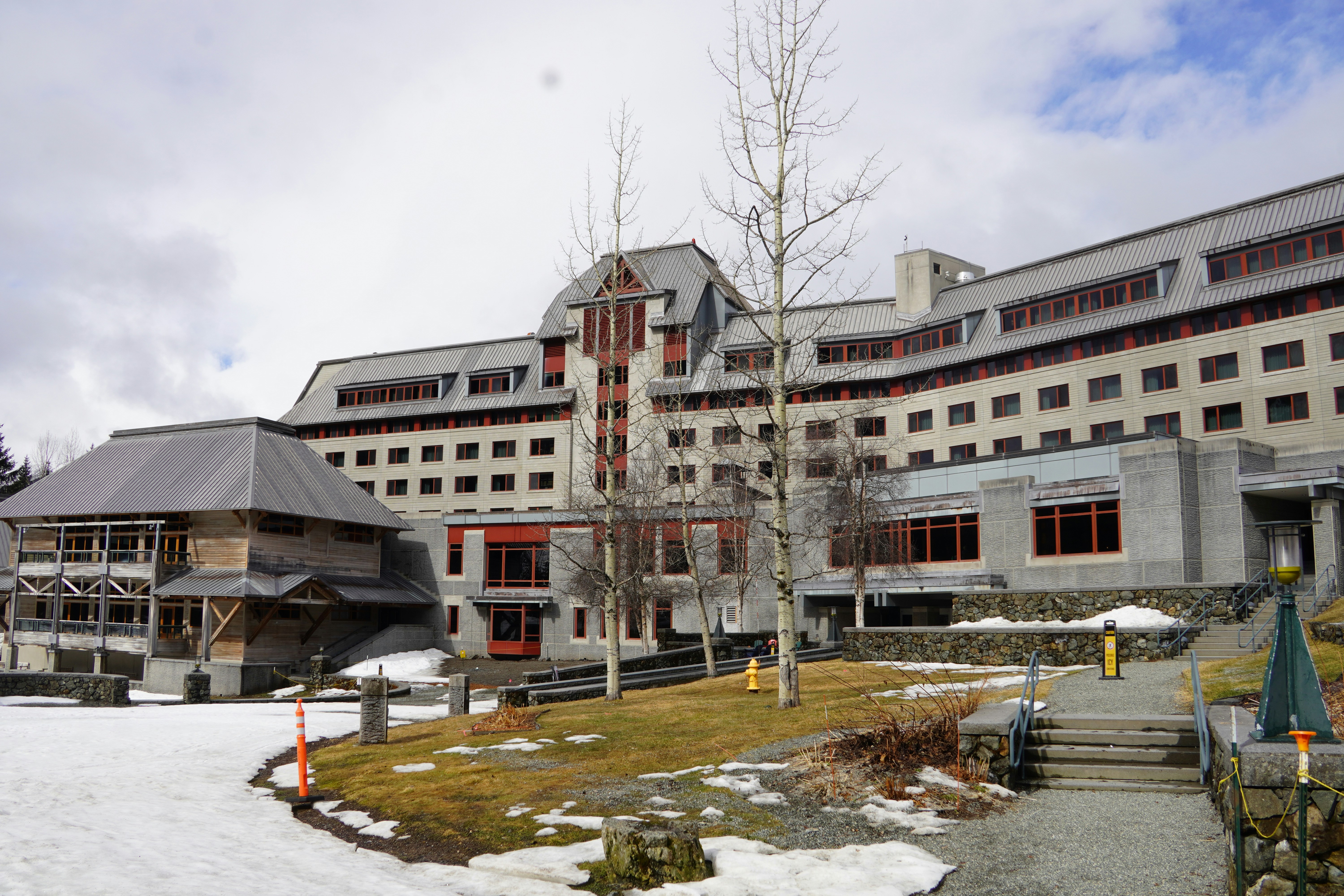 Winter Retreat Facade: A Nordic Lodge in Early Snow