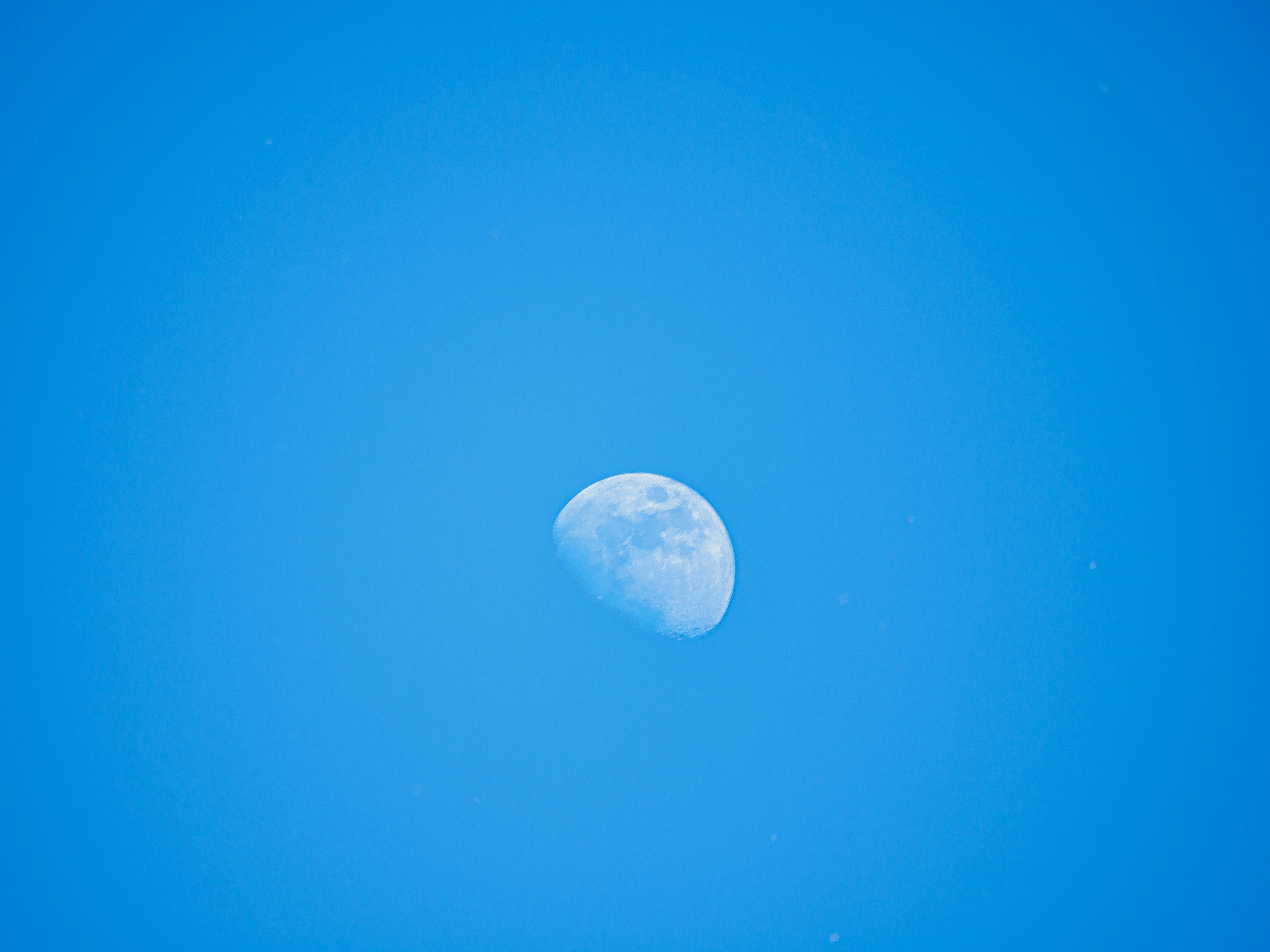 Lunar Crescent in a Clear Blue Sky