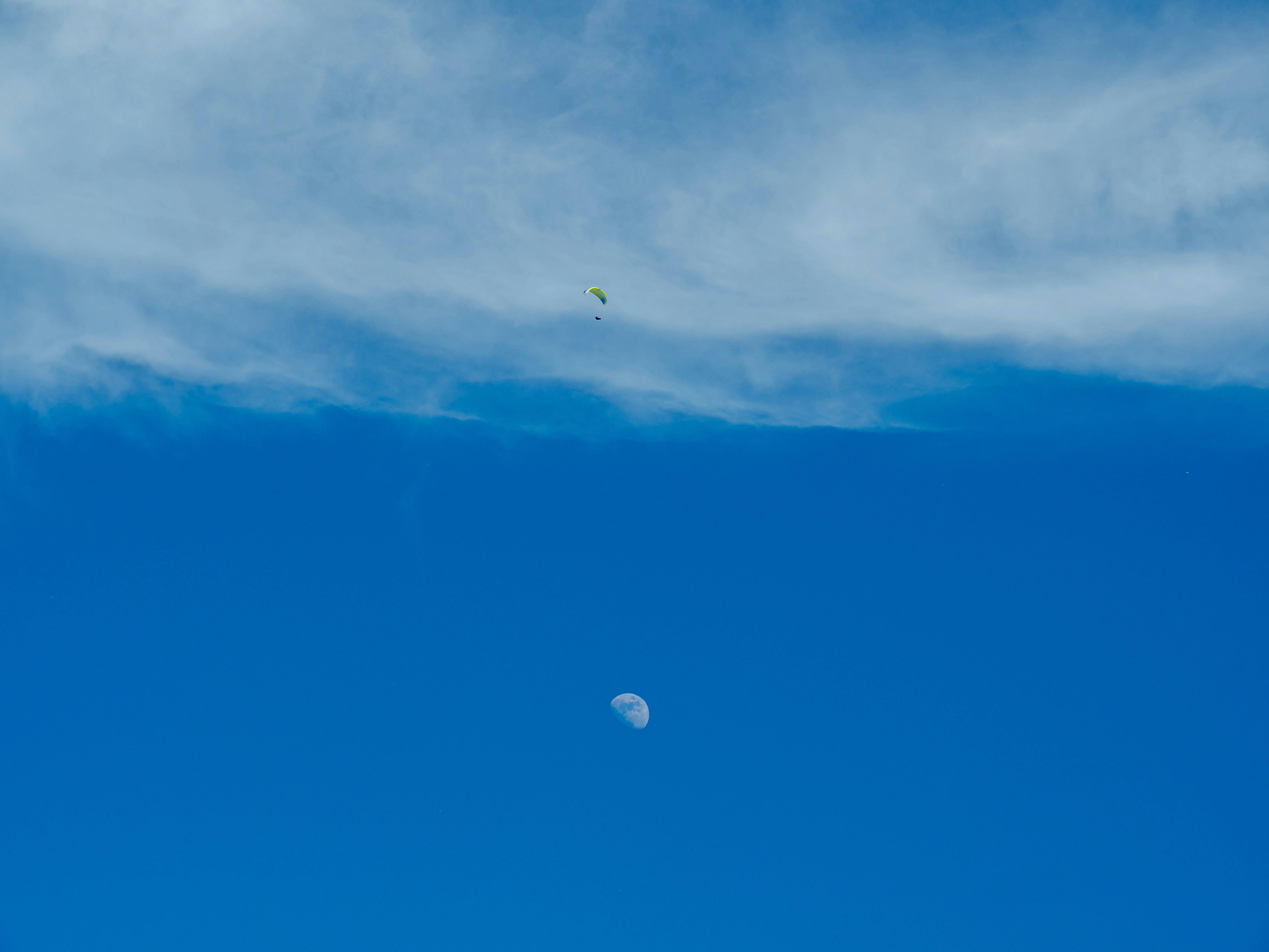 High Skyward Drift: A Kite Traces the Empty Blue
