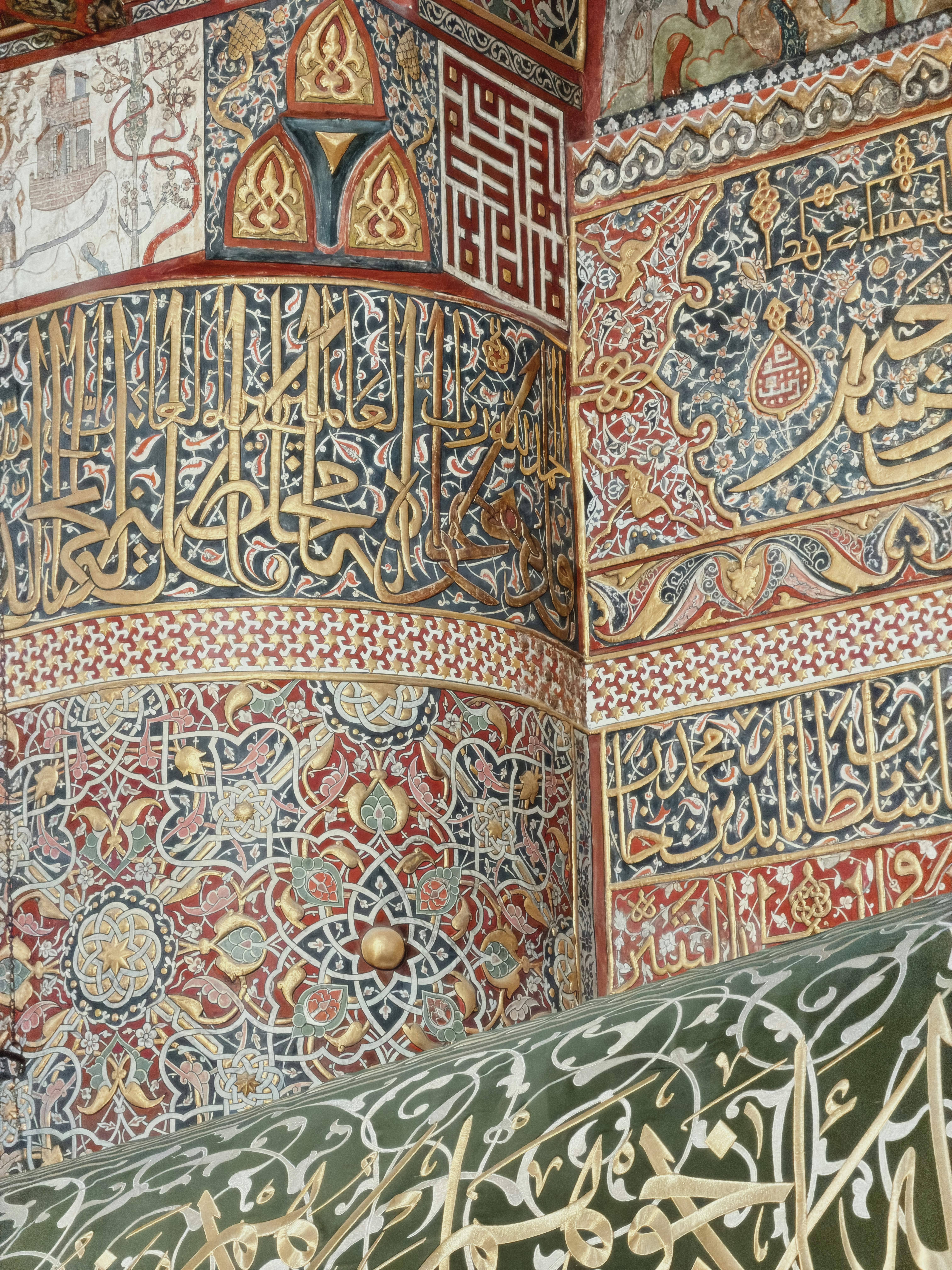 Intricate Tilework and Calligraphy in a Silked Archway Corner