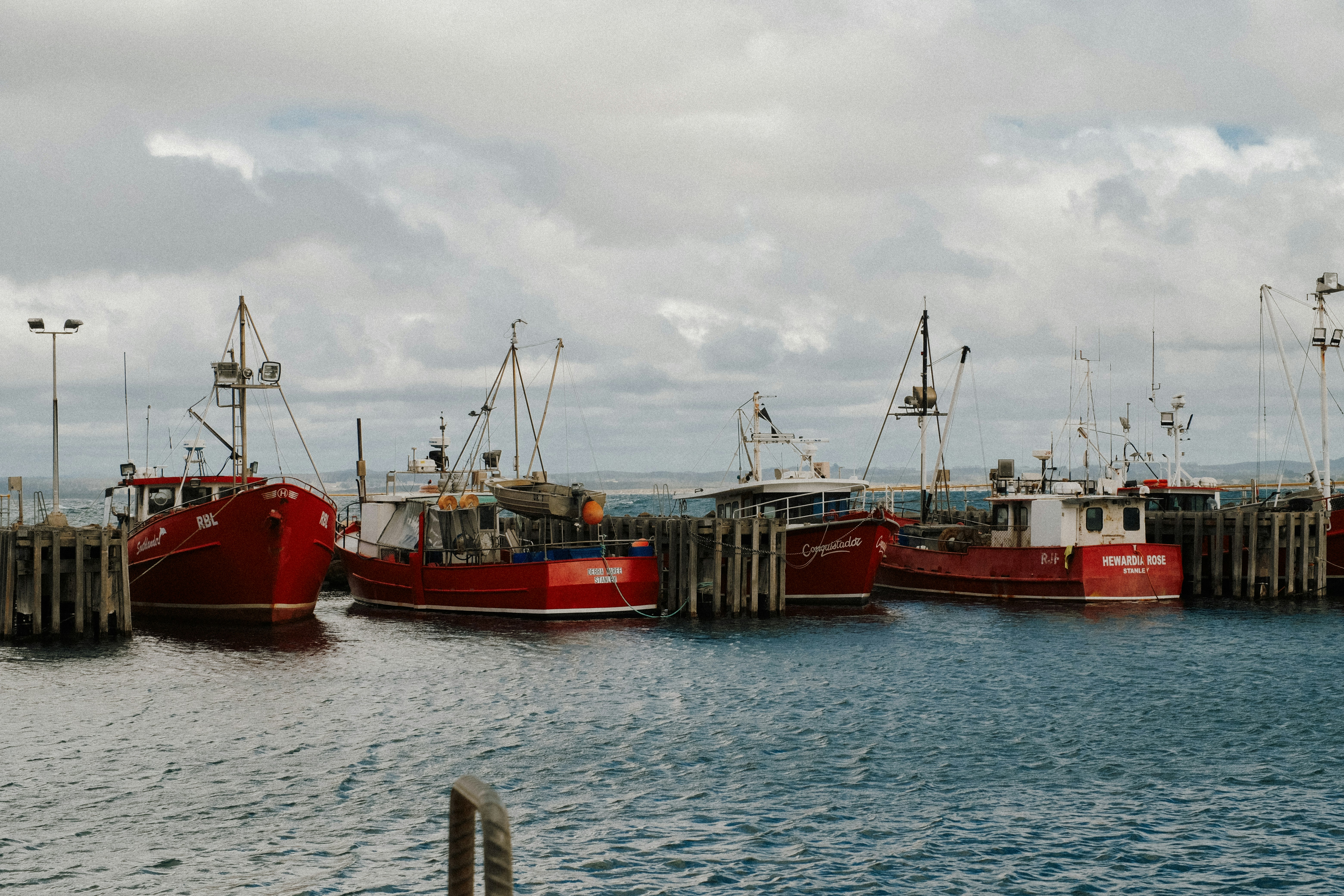 Red Fishermen’s Fleet Resting at Dusk