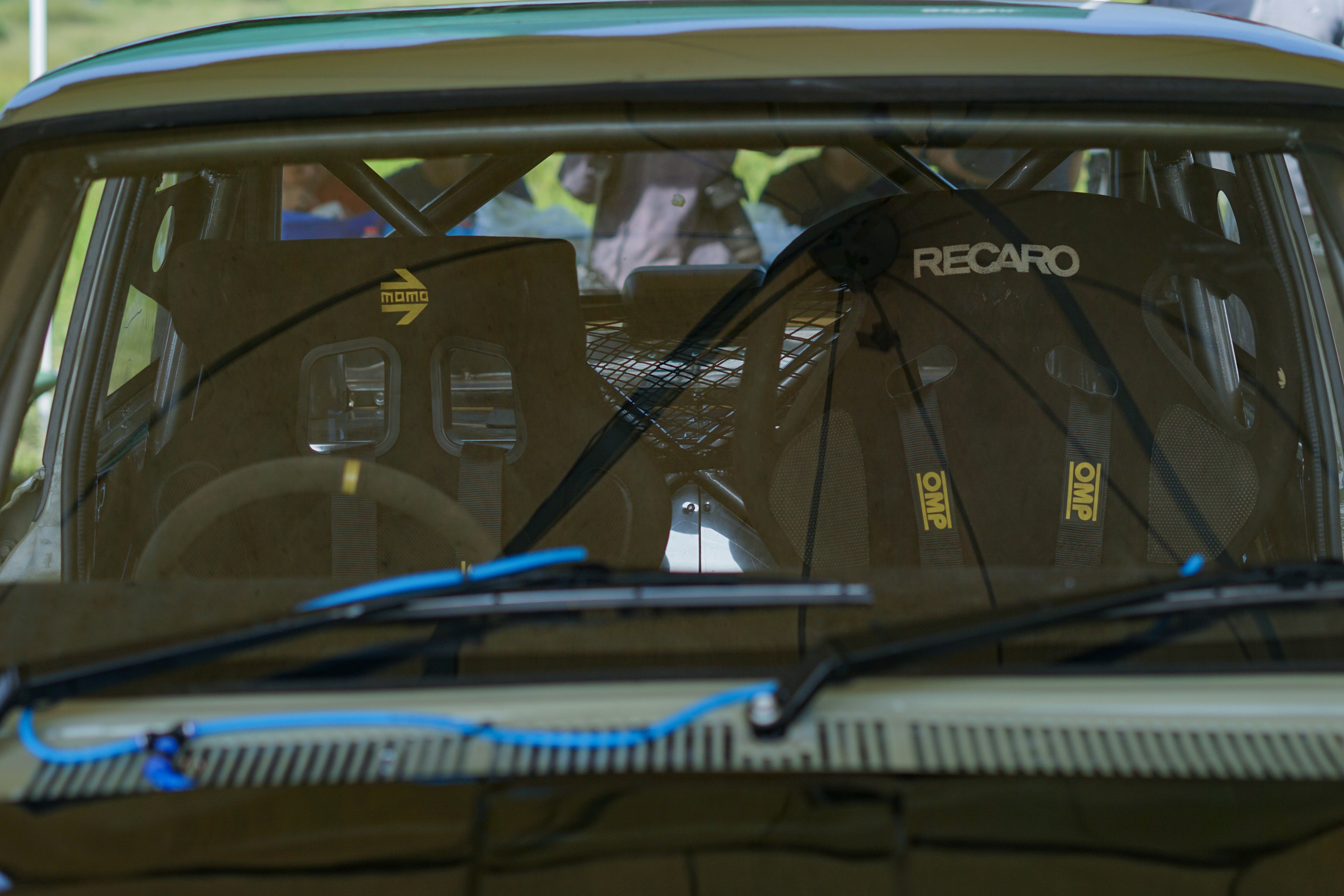 Inside the Racing Cockpit: Recaro Seats and Racing Harnesses through the Windshield