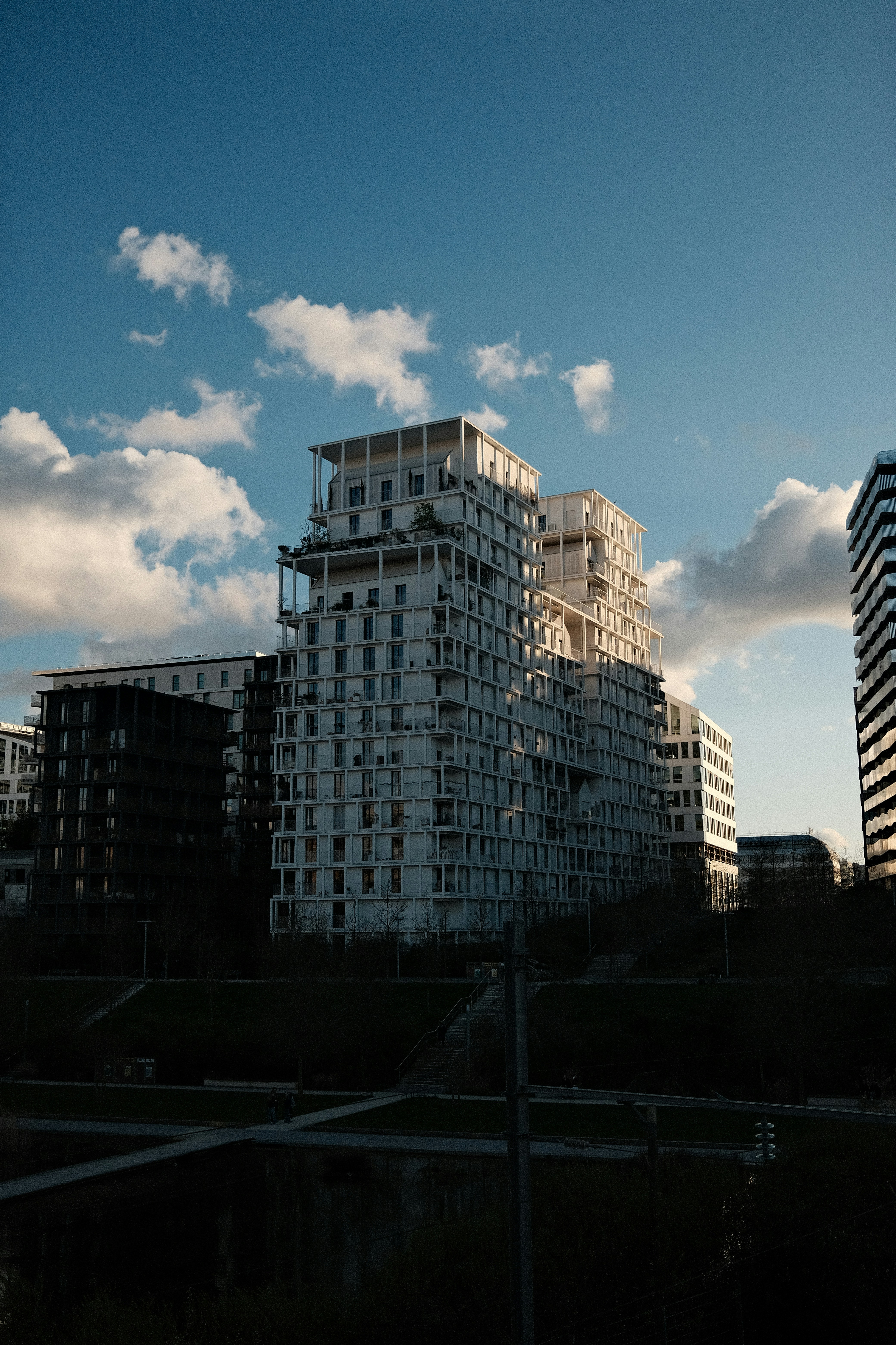 Concrete Tiered Towers Reach Toward a Clear Sky