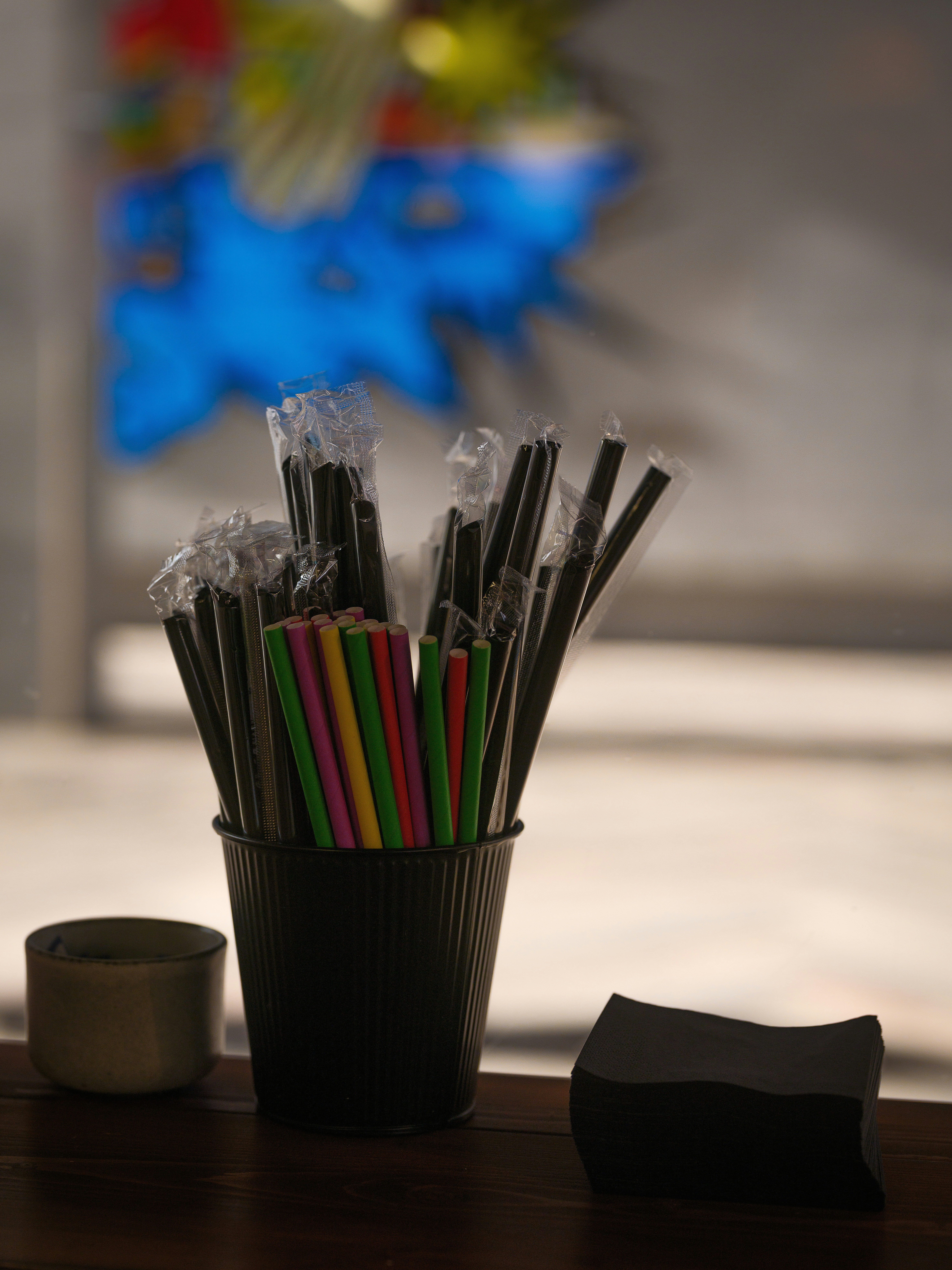 Colored Straws in a Cup: A Quiet Still Life by the Window