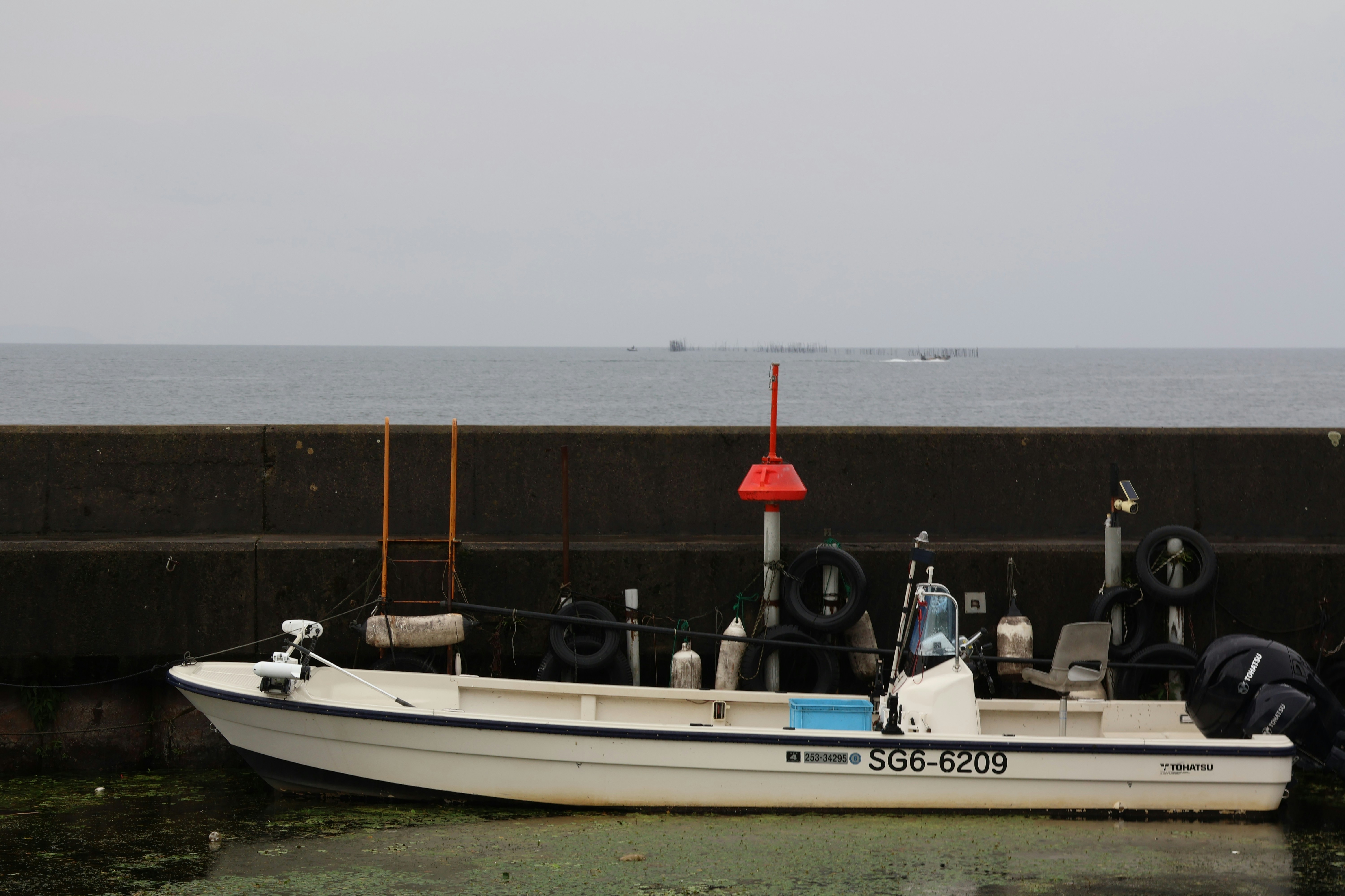 Boat at the Quiet Harbor Edge
