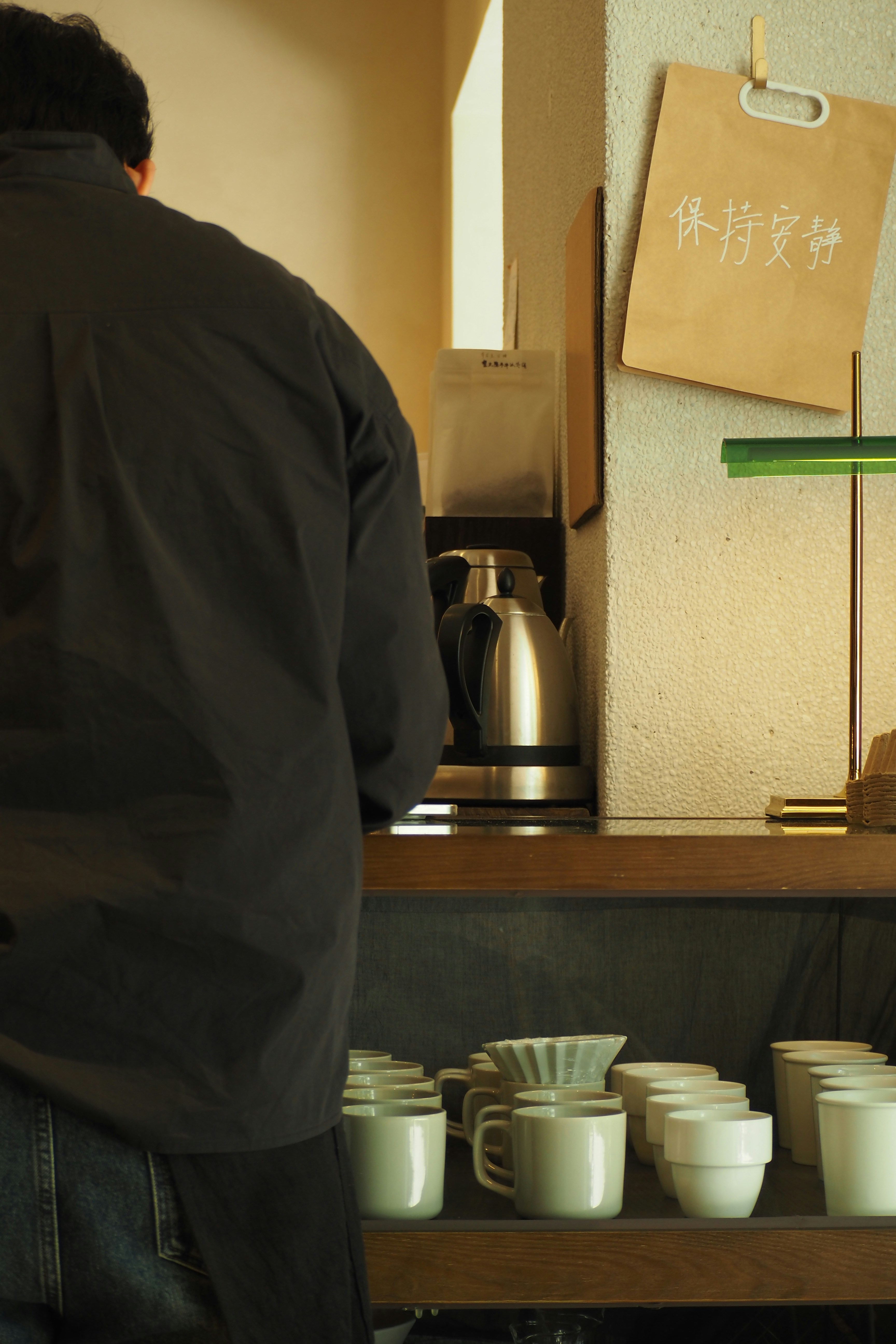 Quiet Morning Brew: A Barista's Corner in Soft Light