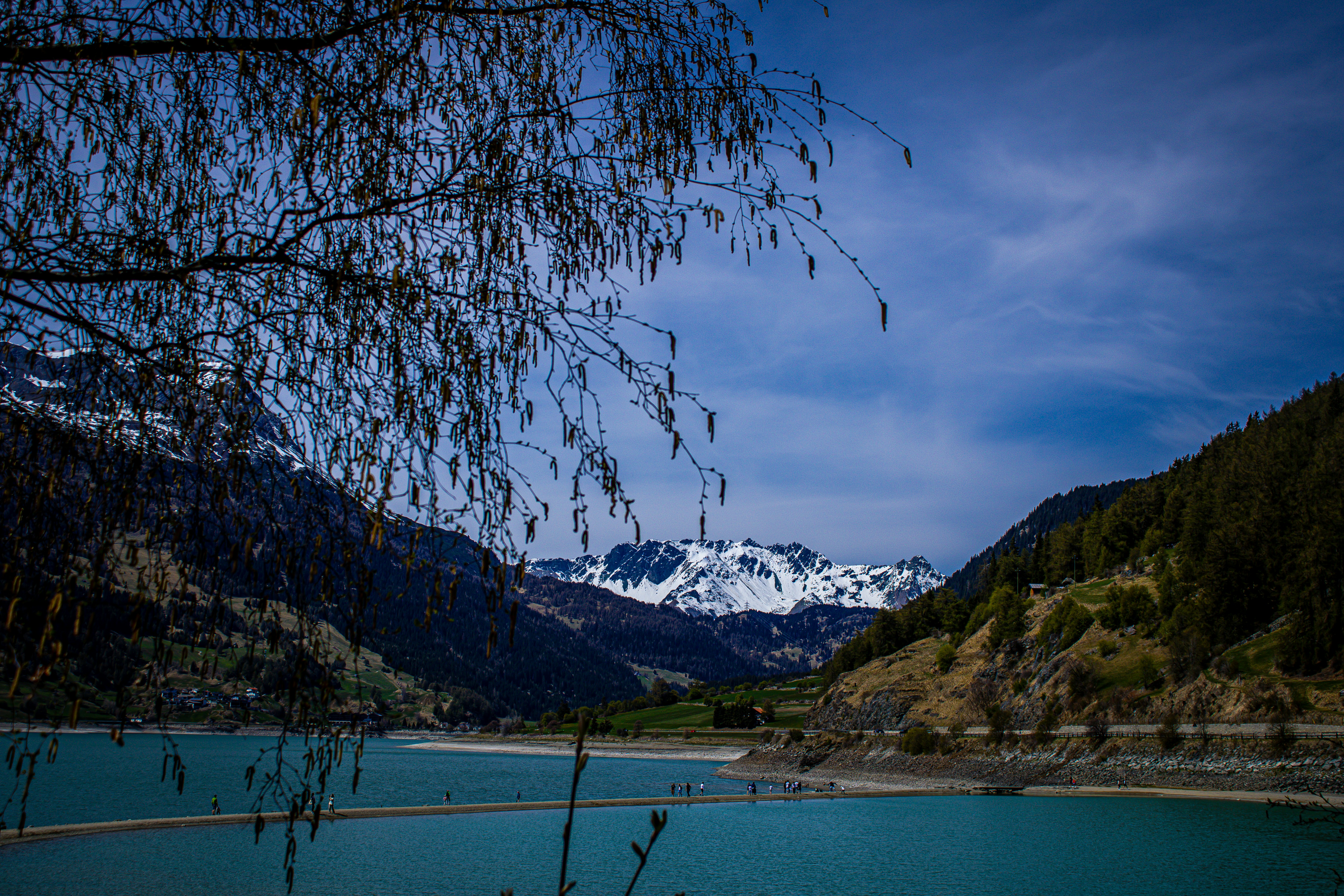 Snow‑capped Peaks Across Turquoise Waters