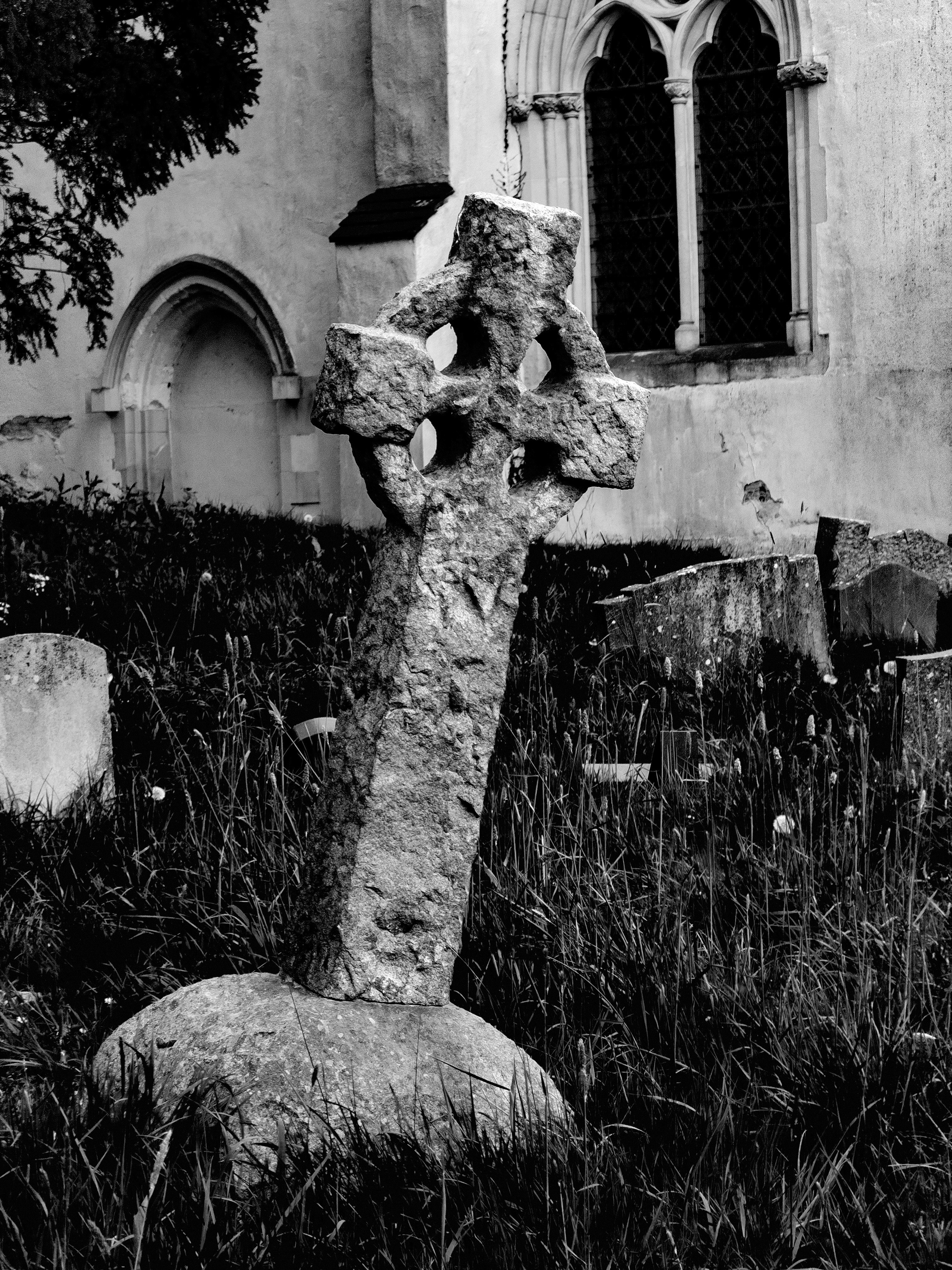 Weathered Celtic Cross in a Quiet Cemetery