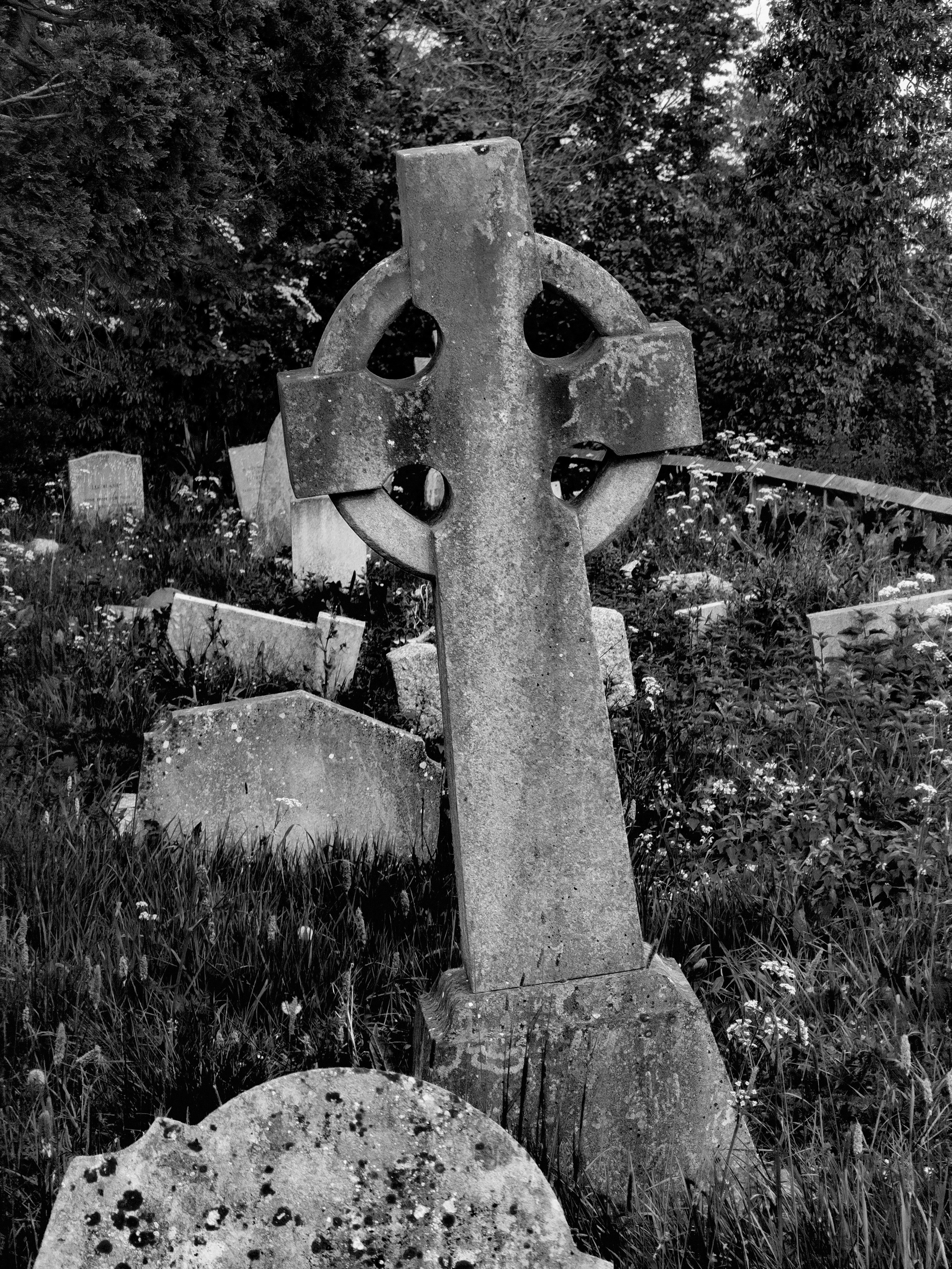 Weathered Celtic Cross in a Quiet Cemetery