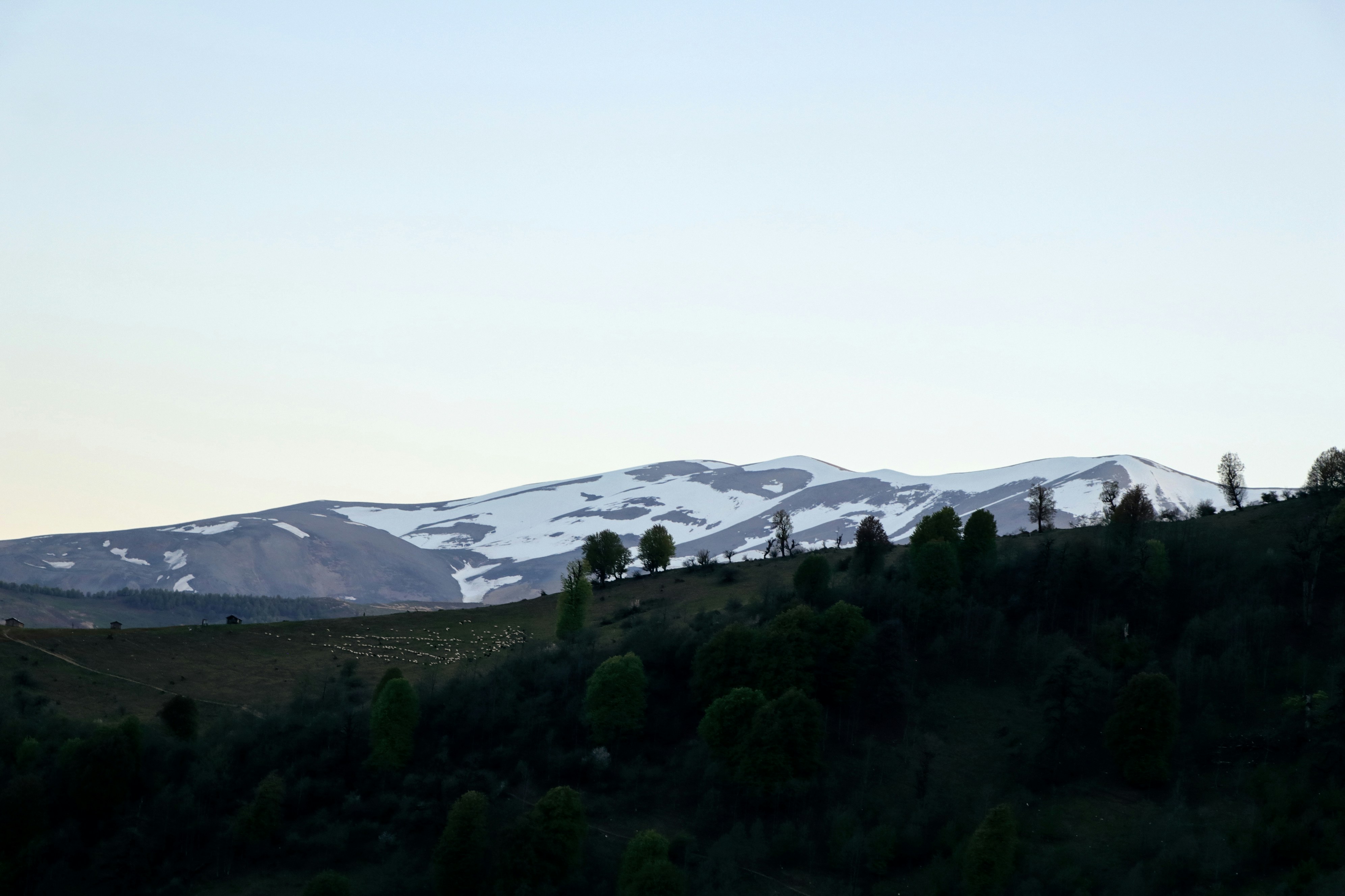 Snow-kissed Ridge Beneath Early Light