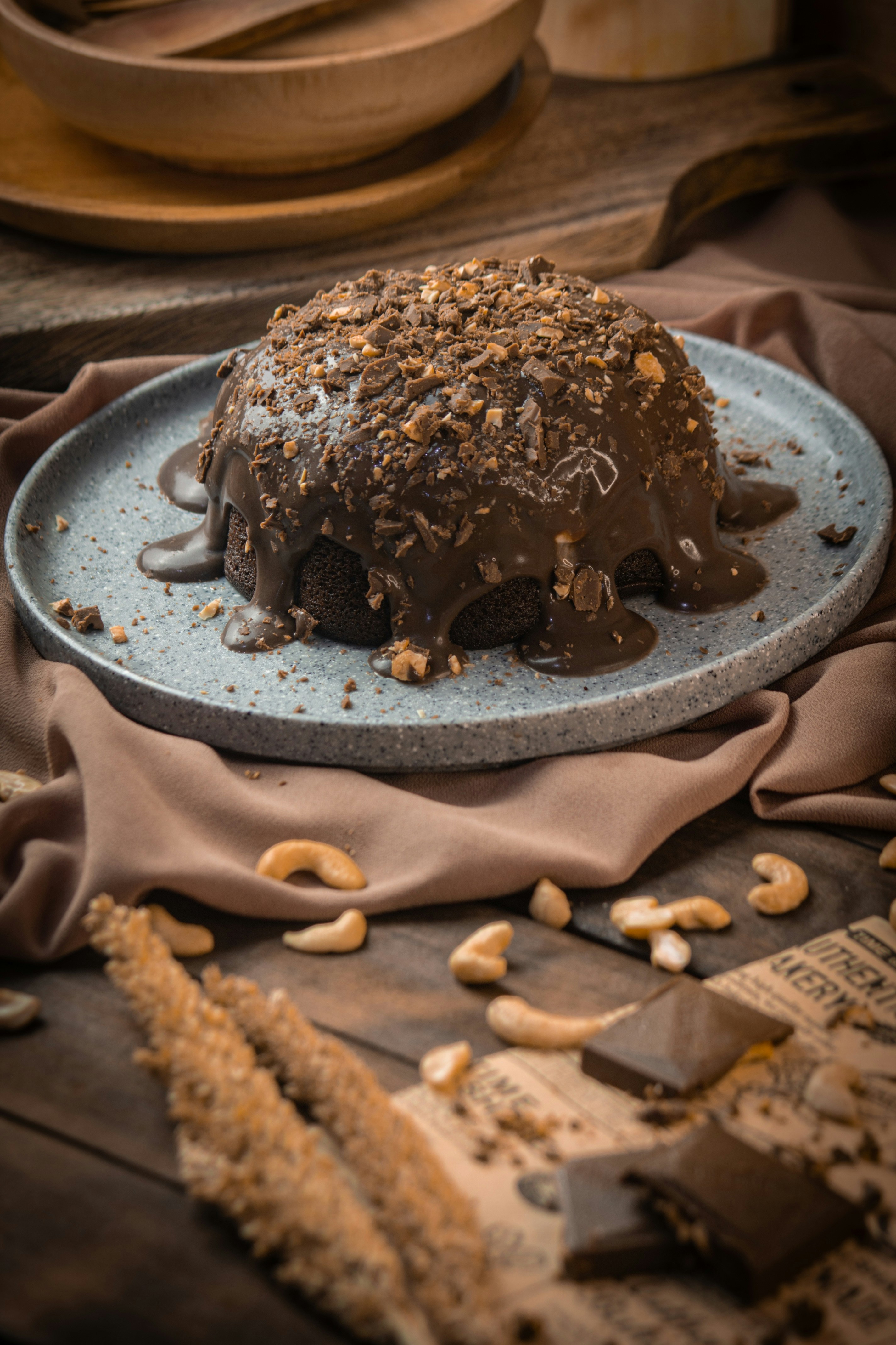 Chocolate Crown: A Rich Dome of Decadence on a Rustic Plate
