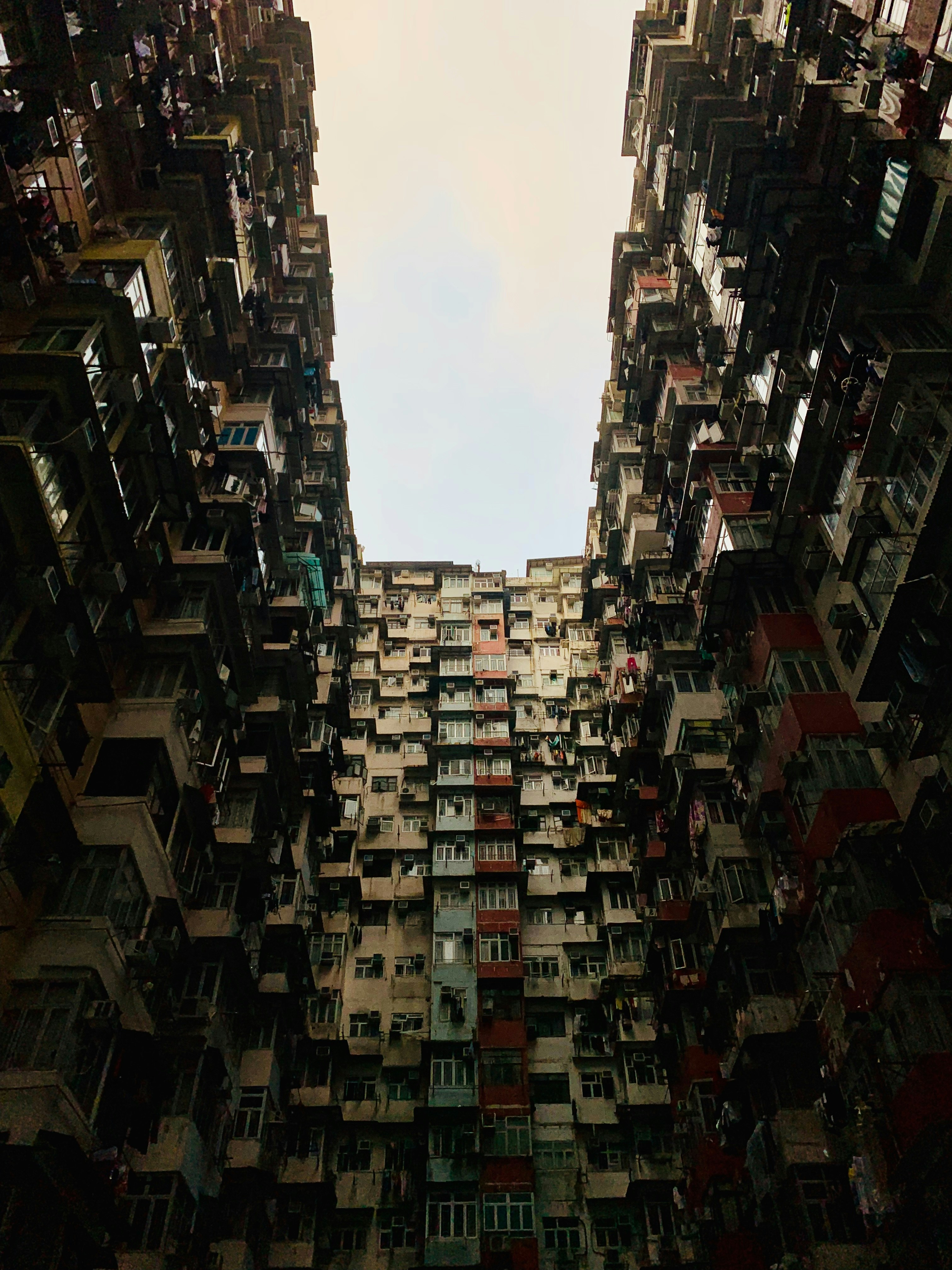 Between Towers: Sky Narrow Gap Amid Dense Urban Facades