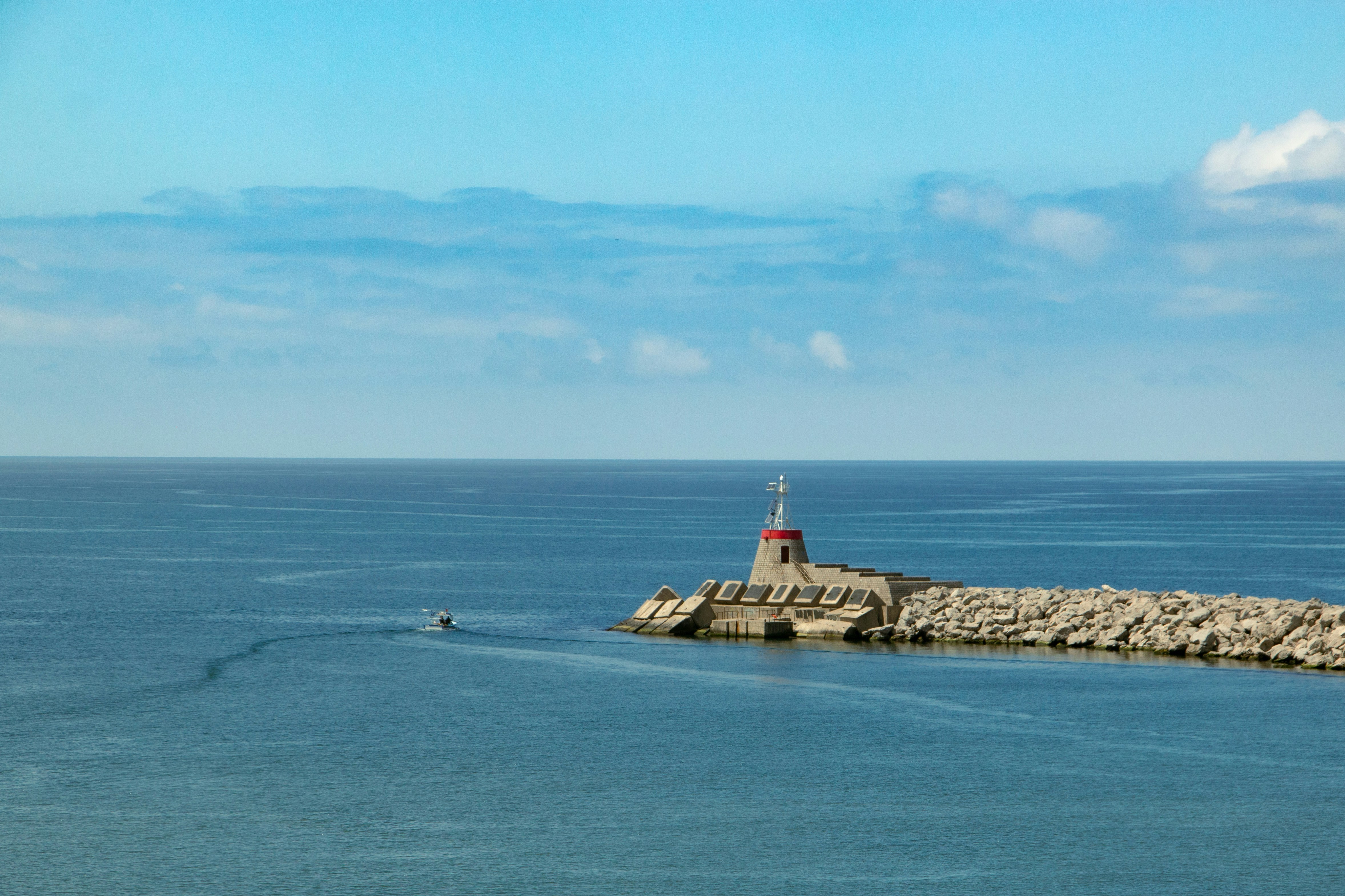 Harbor Breakwater under a Quiet Sky