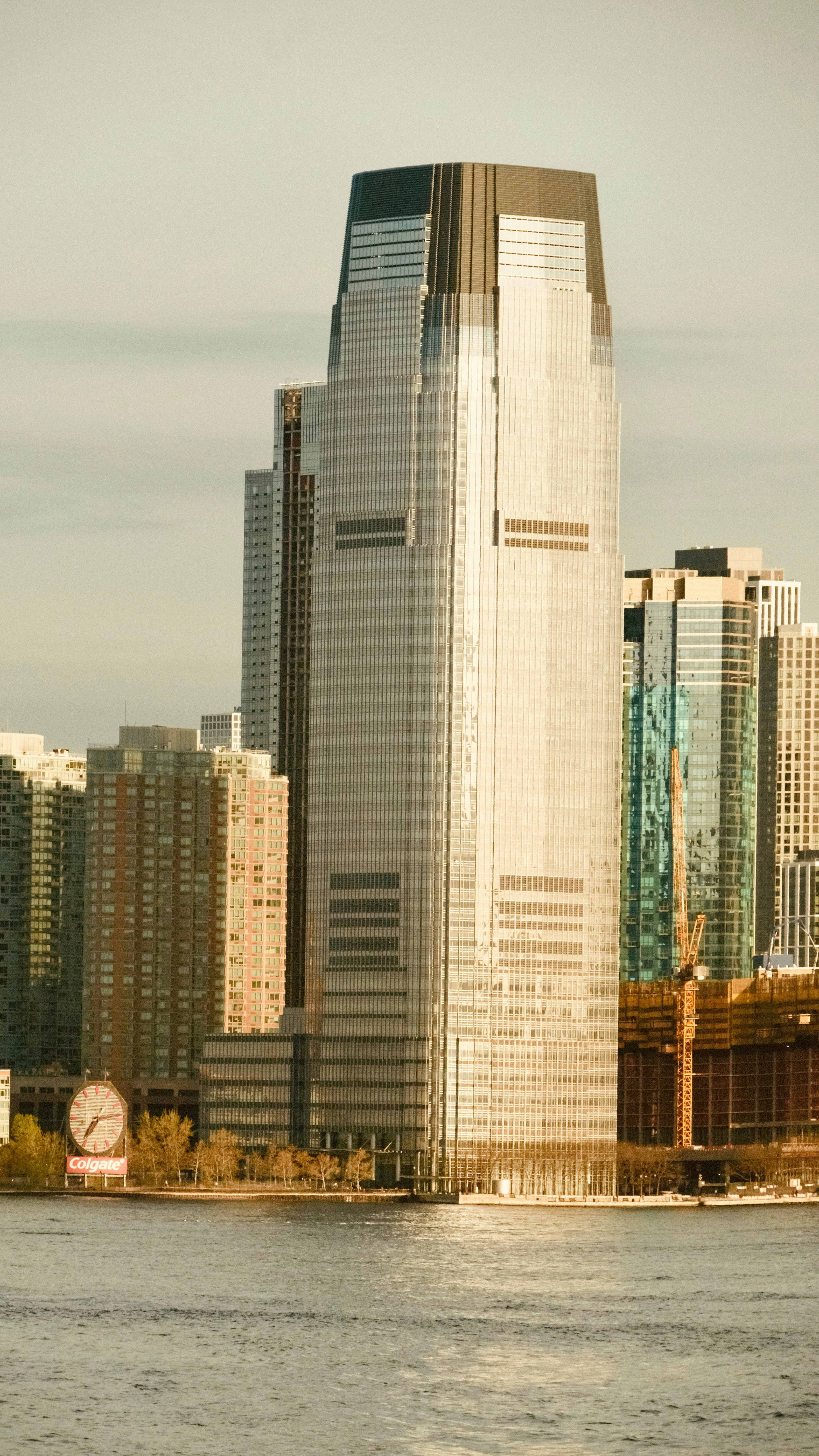Towering Glass: Cityscape Rising from the Waterfront